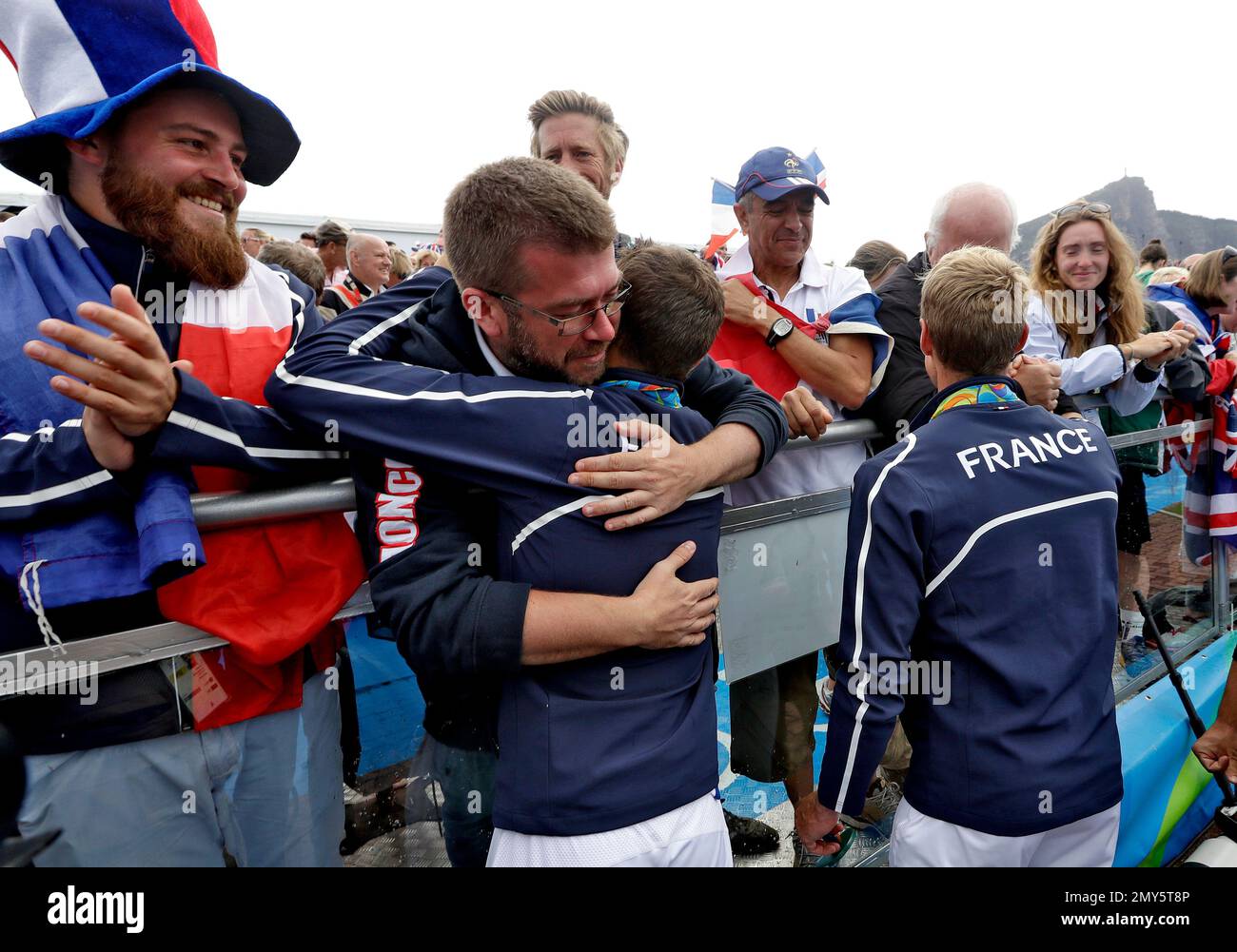 Gold medalist Pierre Houin and Jeremie Azou, of France, celebrate after ...