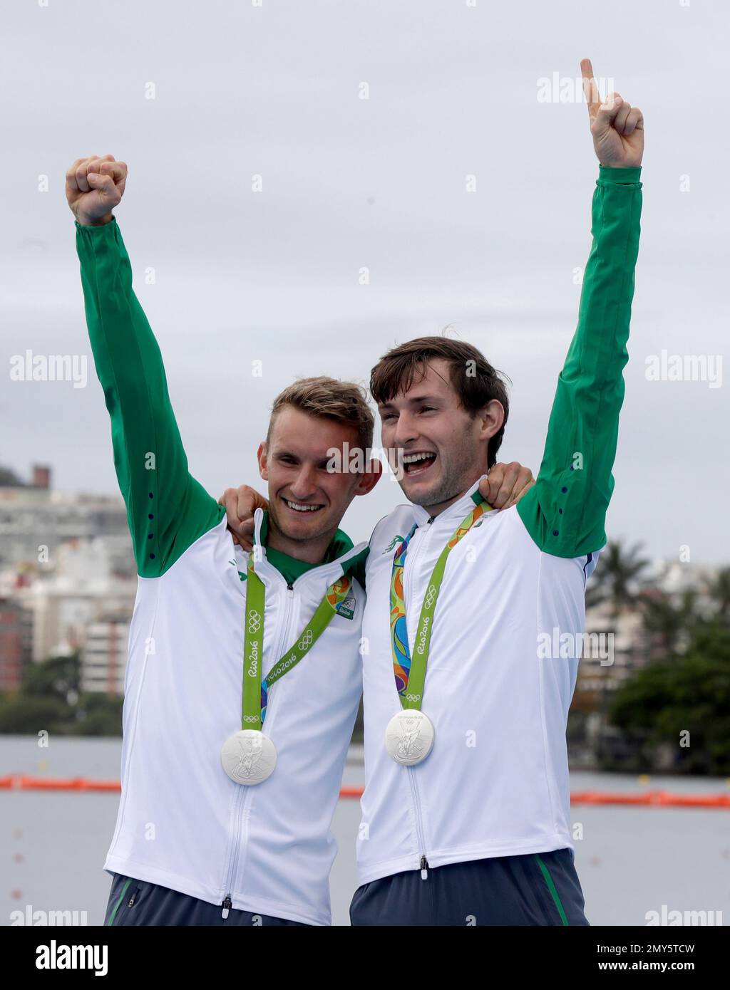 Gary O'Donovan and Paul O'Donovan, of Ireland, celebrate their silver ...
