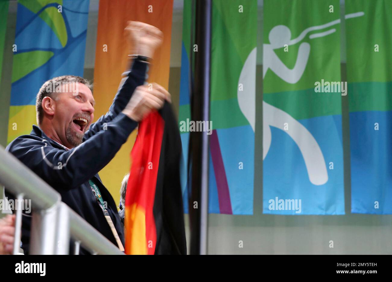 Supporters for Henri Junghaenel of Germany celebrates his victory for ...
