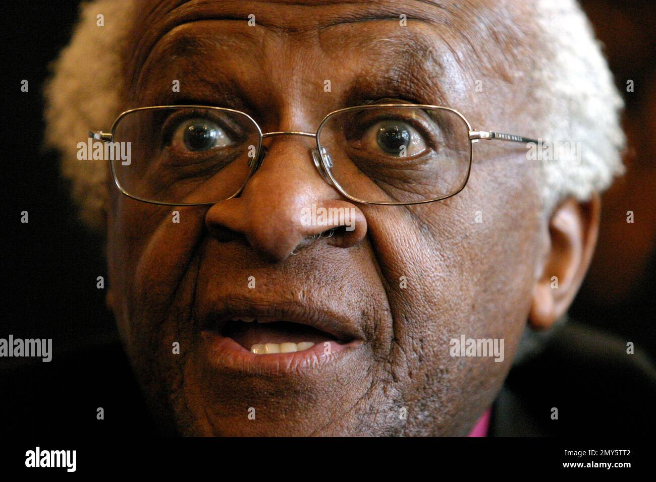 A closeup of the face of a South African Anglican bishop and theologian ...