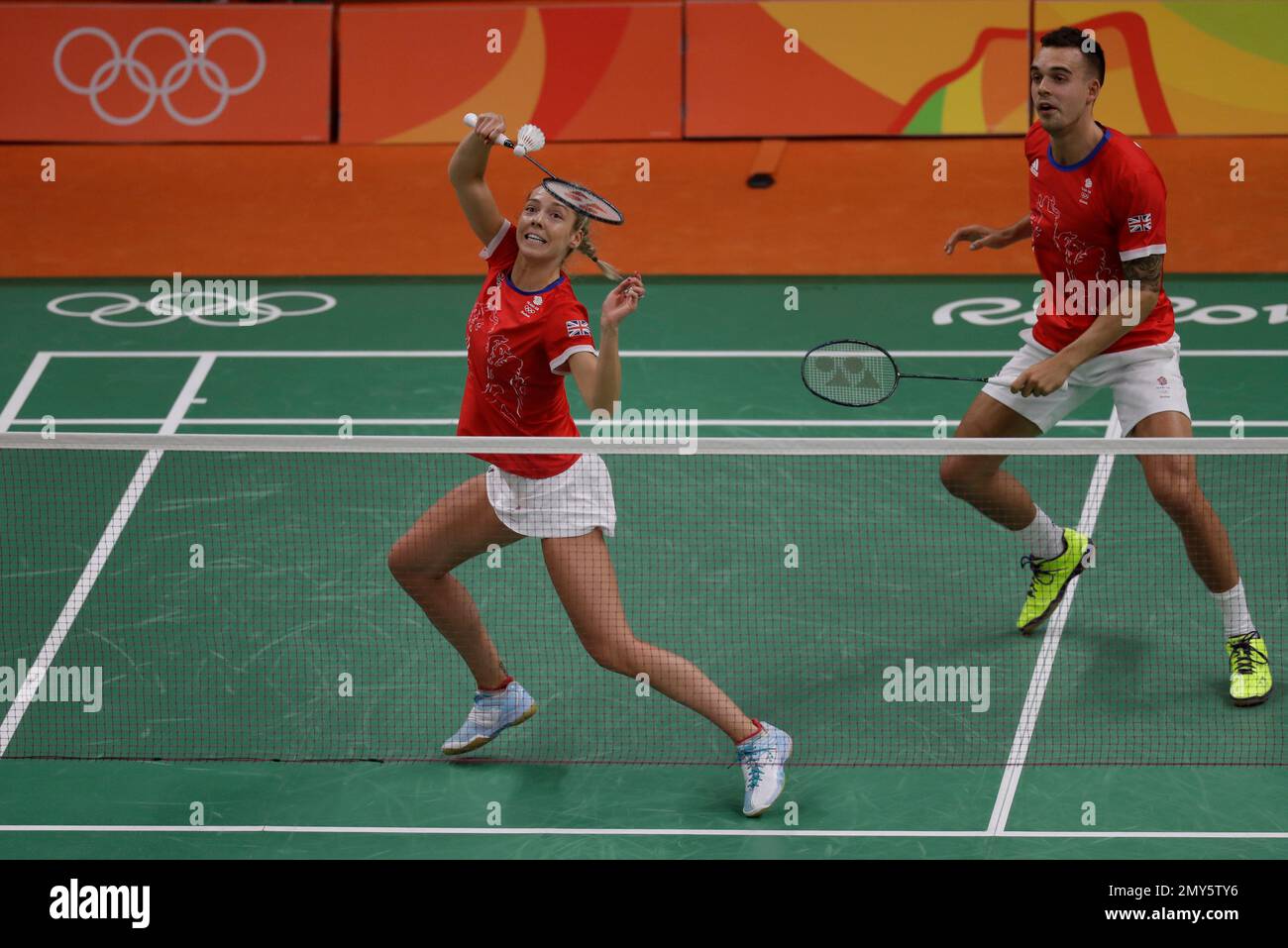 Great Britain's Chris Adcock, right, and Gabrielle Adcock return a shot ...