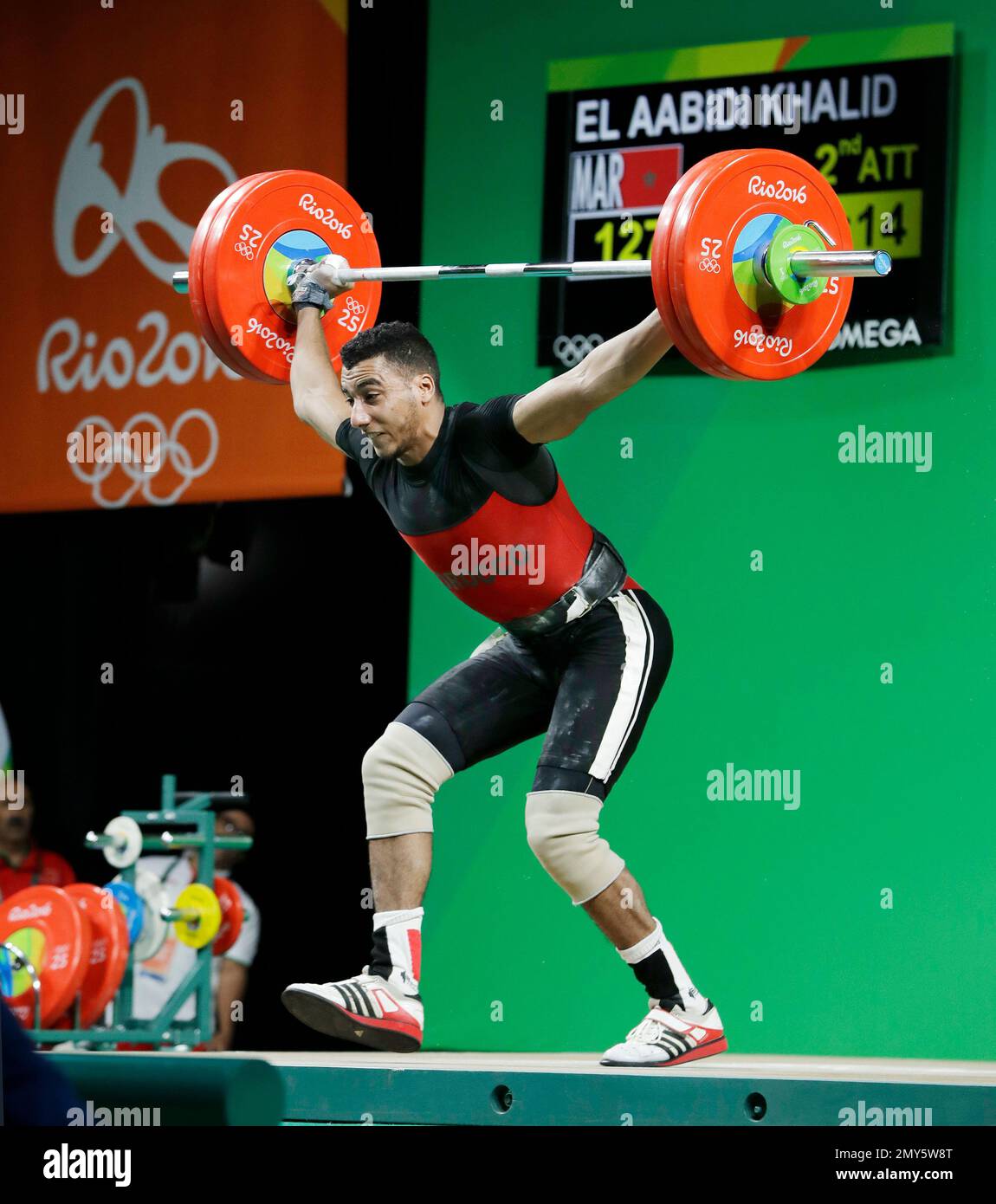 Khalid El Aabidi, of Morocco, steps off the platform as he tries to ...