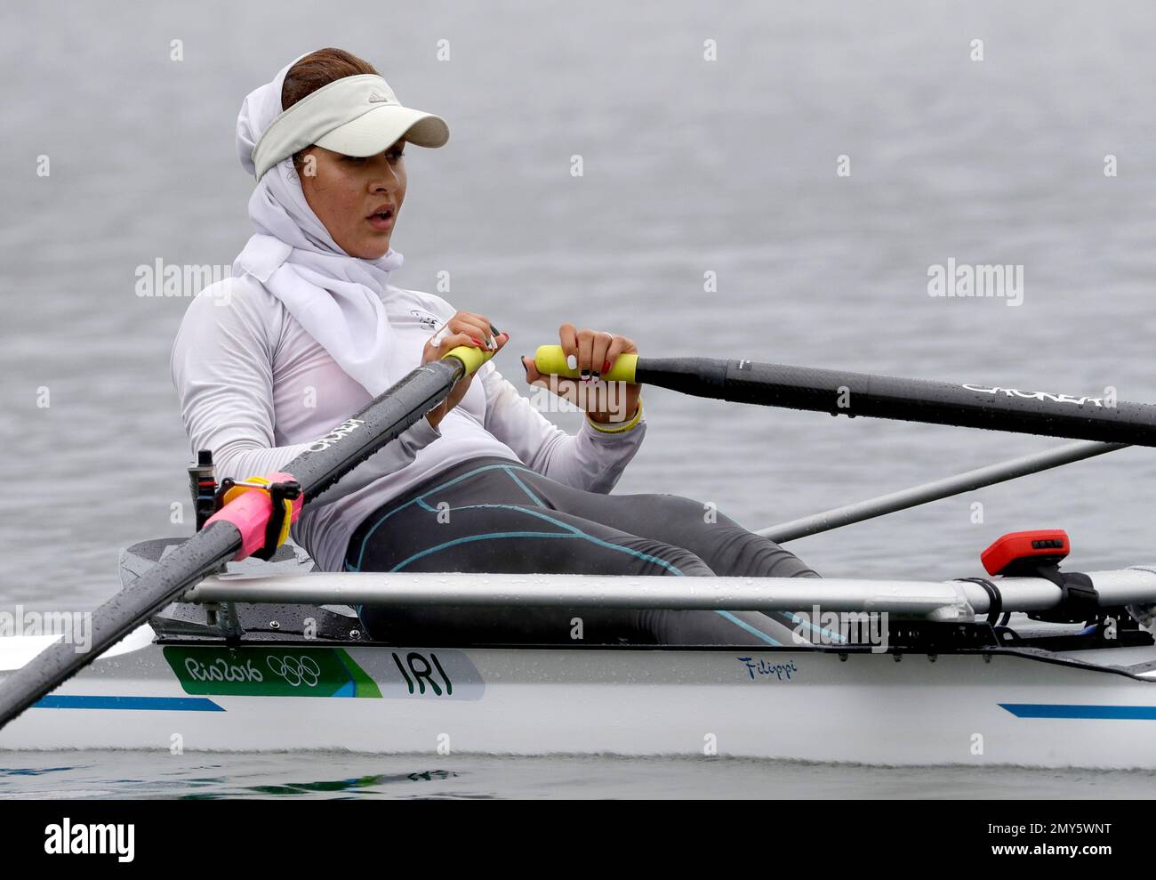 Mahsa Javer, of Iran, rows to shore after competing in the women's ...
