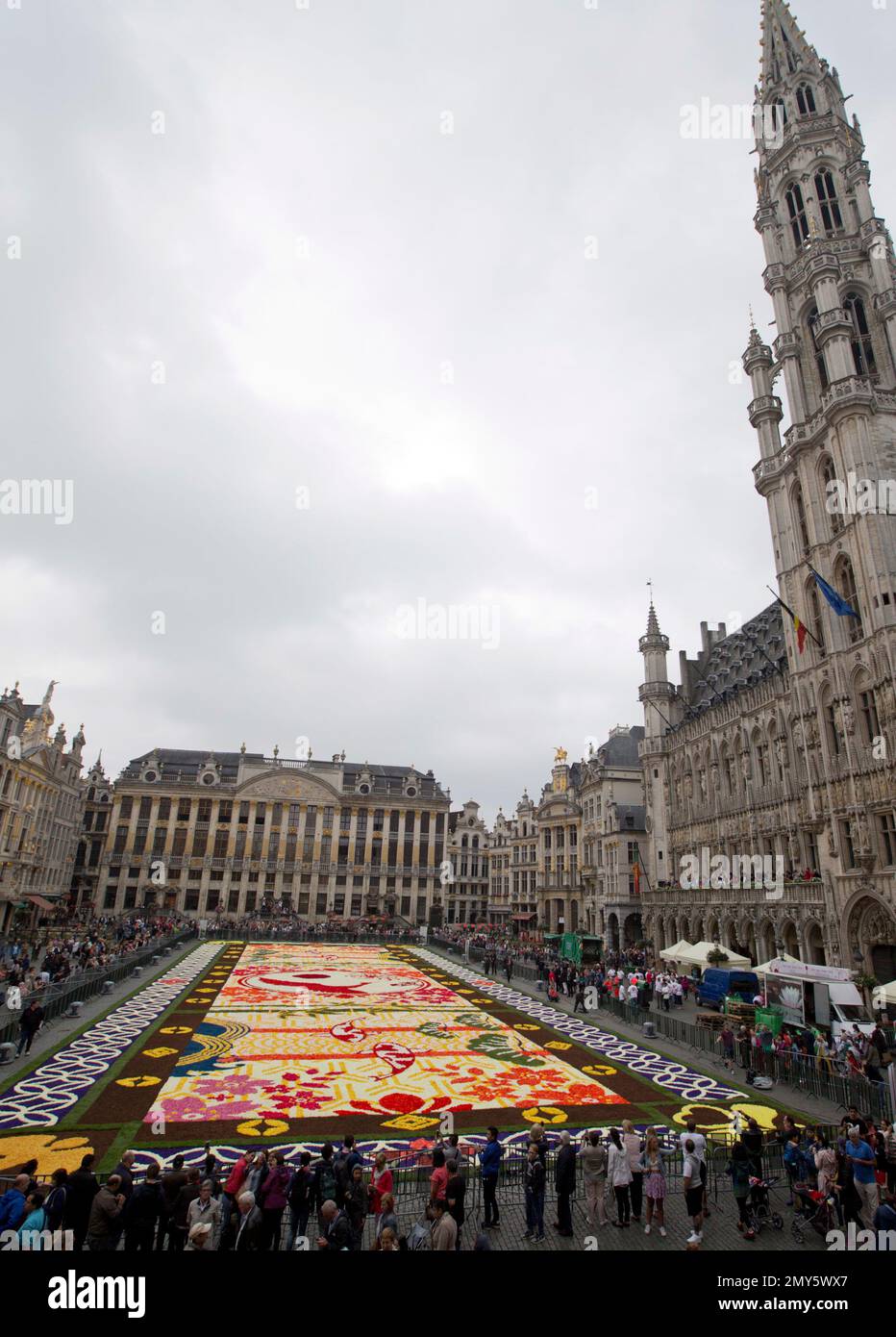 Visitors view a giant begonia flower carpet on the historical Grand ...