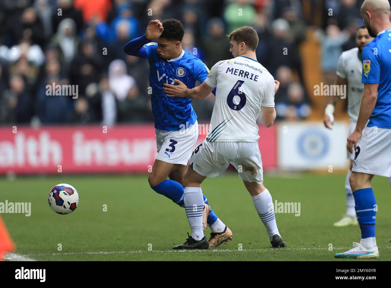 Tranmeres Chris Merrie battles with Stockports Kyle Knoyle during the ...