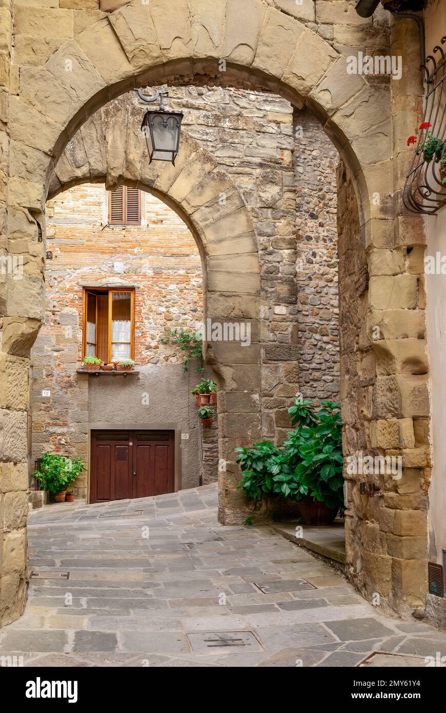Medieval arcade on a alley at Anghiari, Province of Arezzo, Tuscany ...