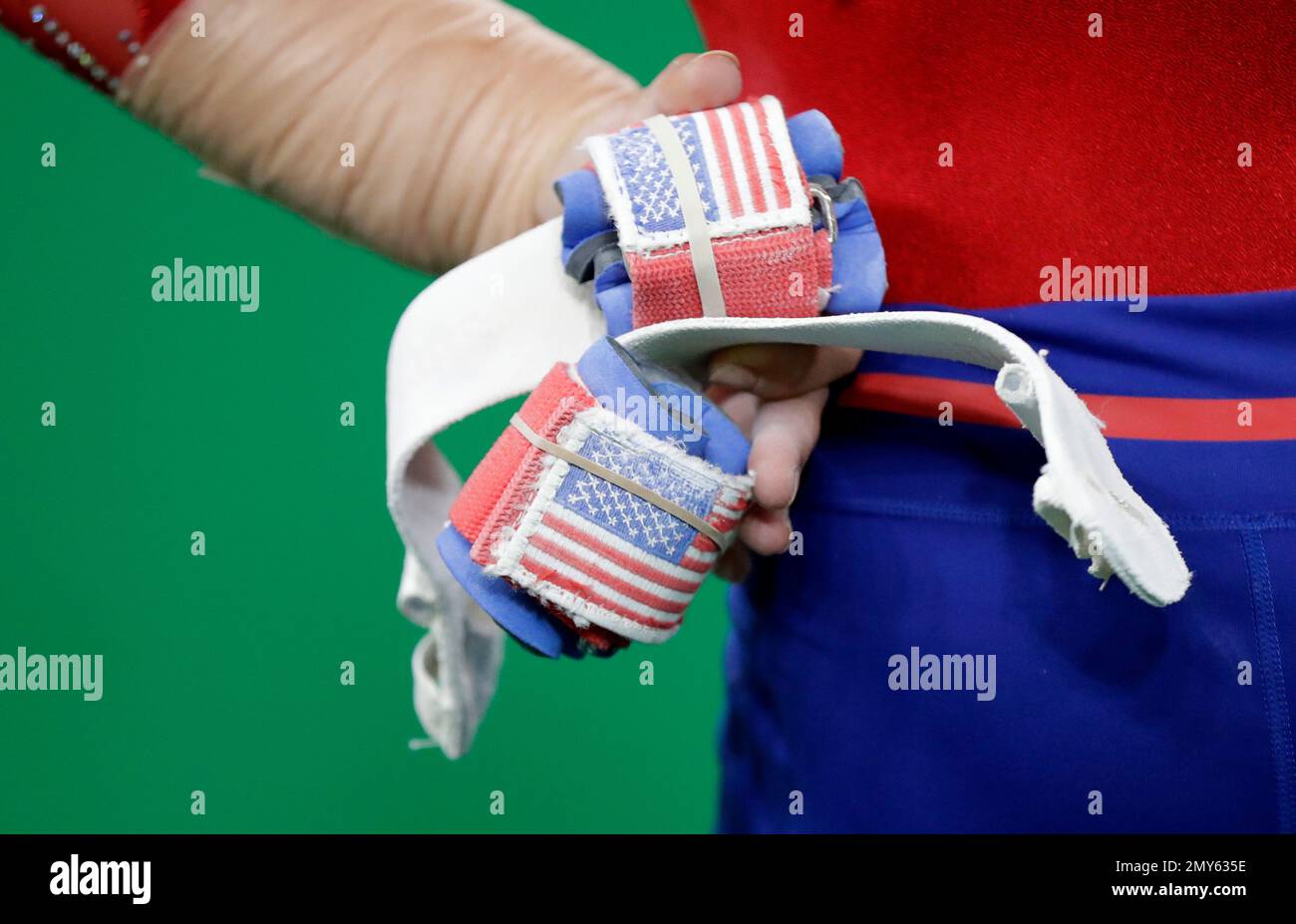 United States' Aly Raisman rests after her routine on the vault during ...