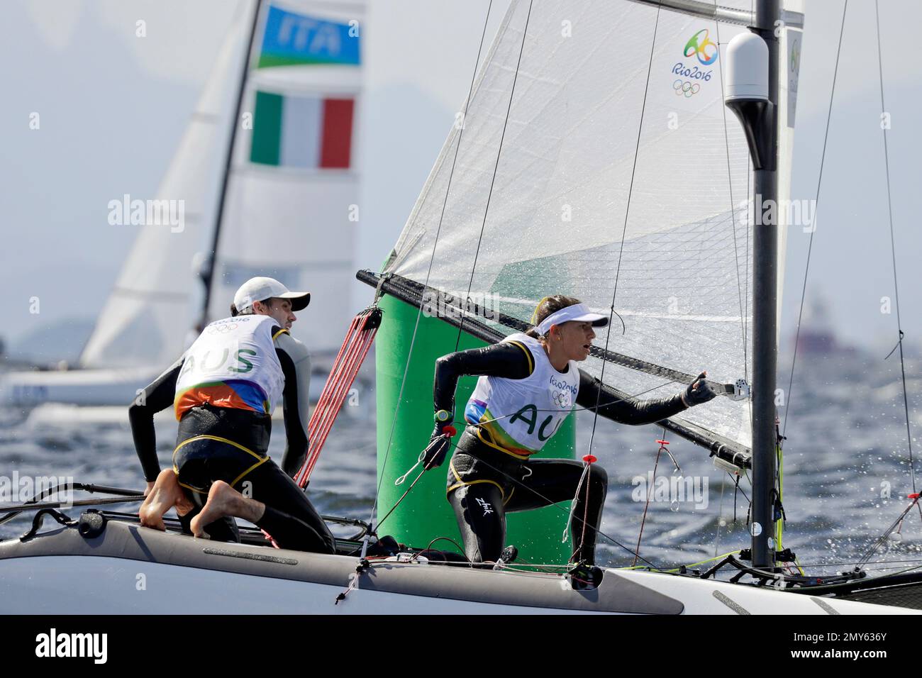 Australia's Jason Waterhouse, left, and Lisa Dramanin competes during ...