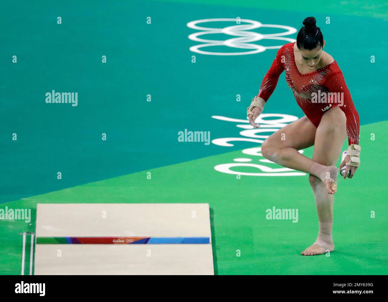 United States' Aly Raisman prepares for her routine on the vault during ...