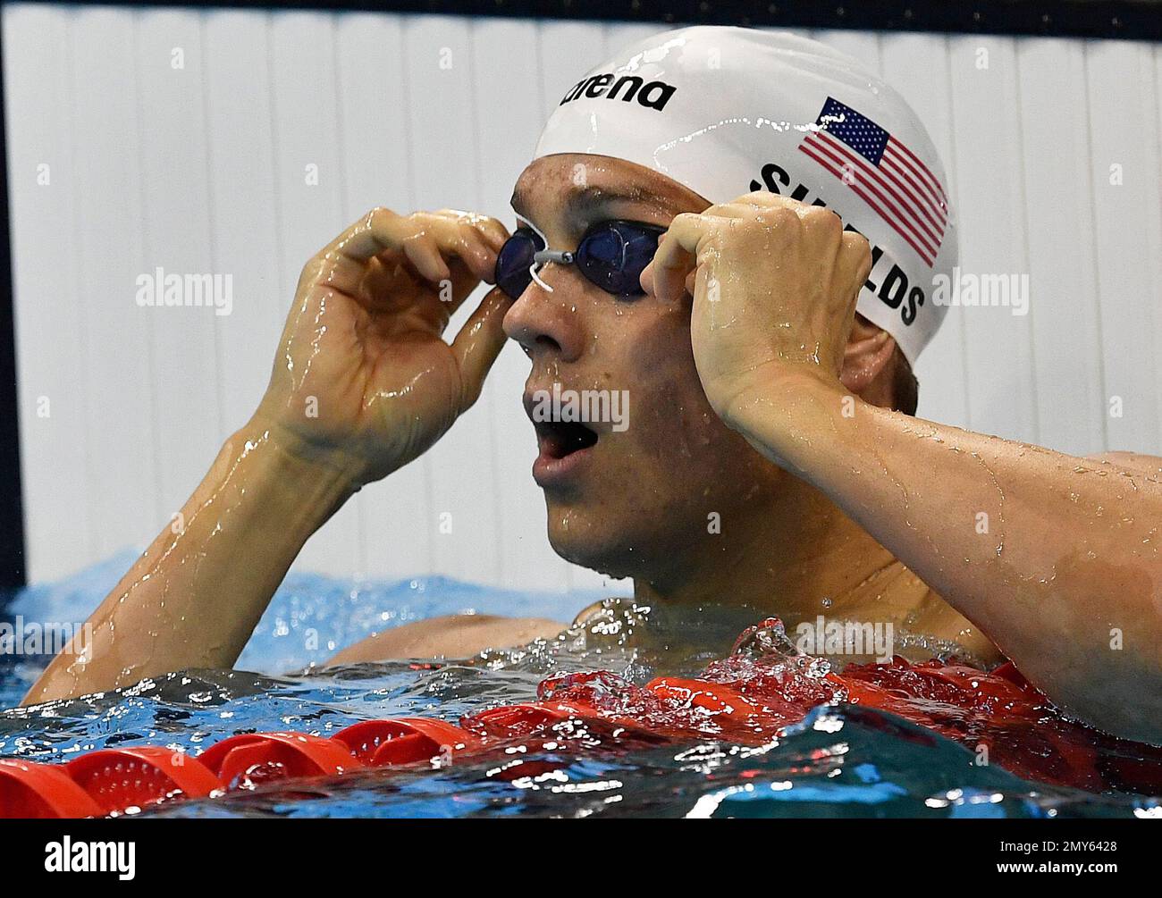 United States' Tom Shields checks his time after a men's 100-meter ...