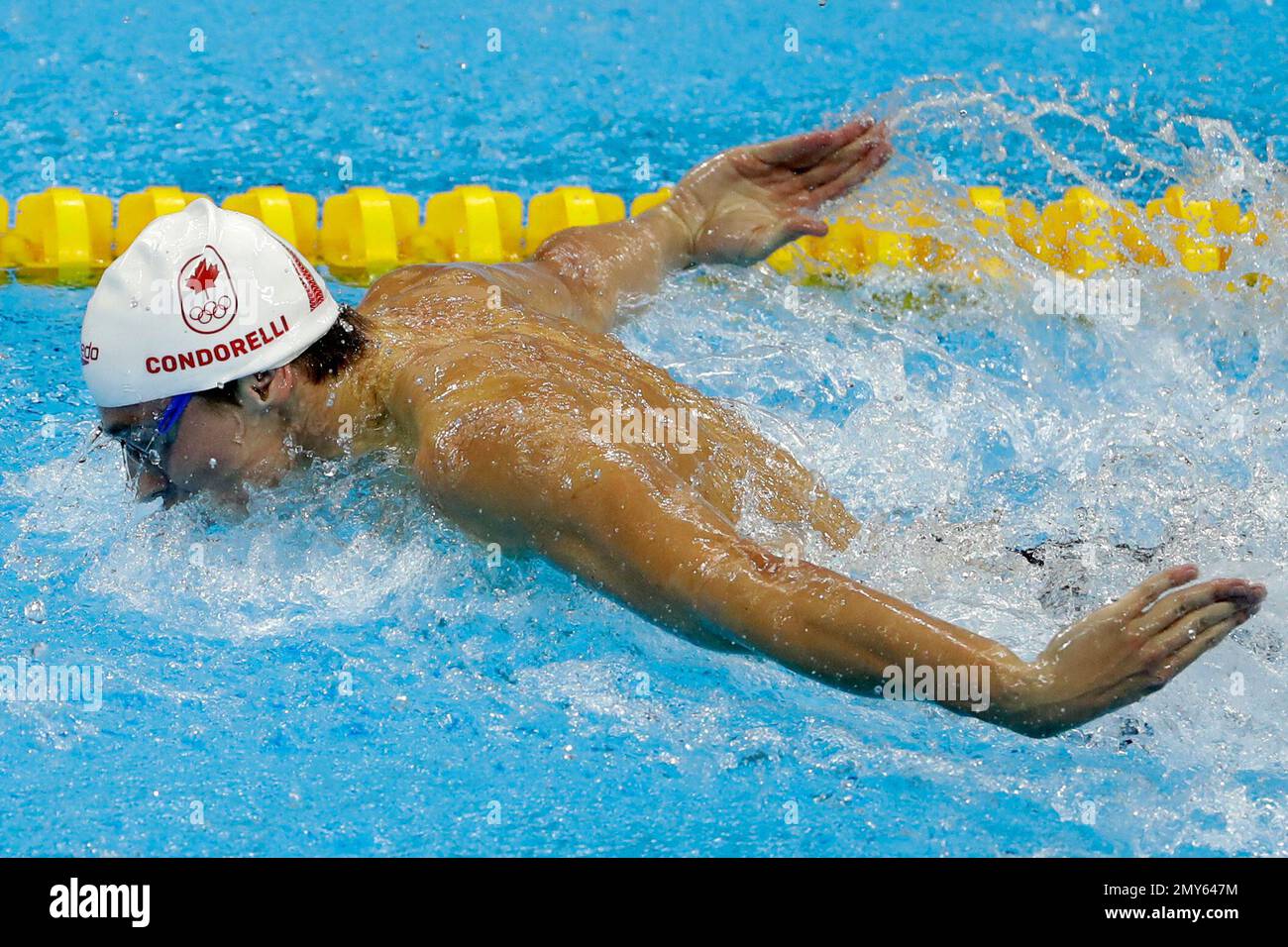 Canada's Santo Condorelli compete in a a men's 100-meter butterfly heat ...