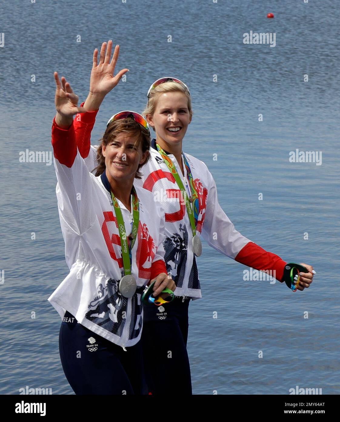 Victoria Thornley and Katherine Grainger, of Britain, wave to fans ...