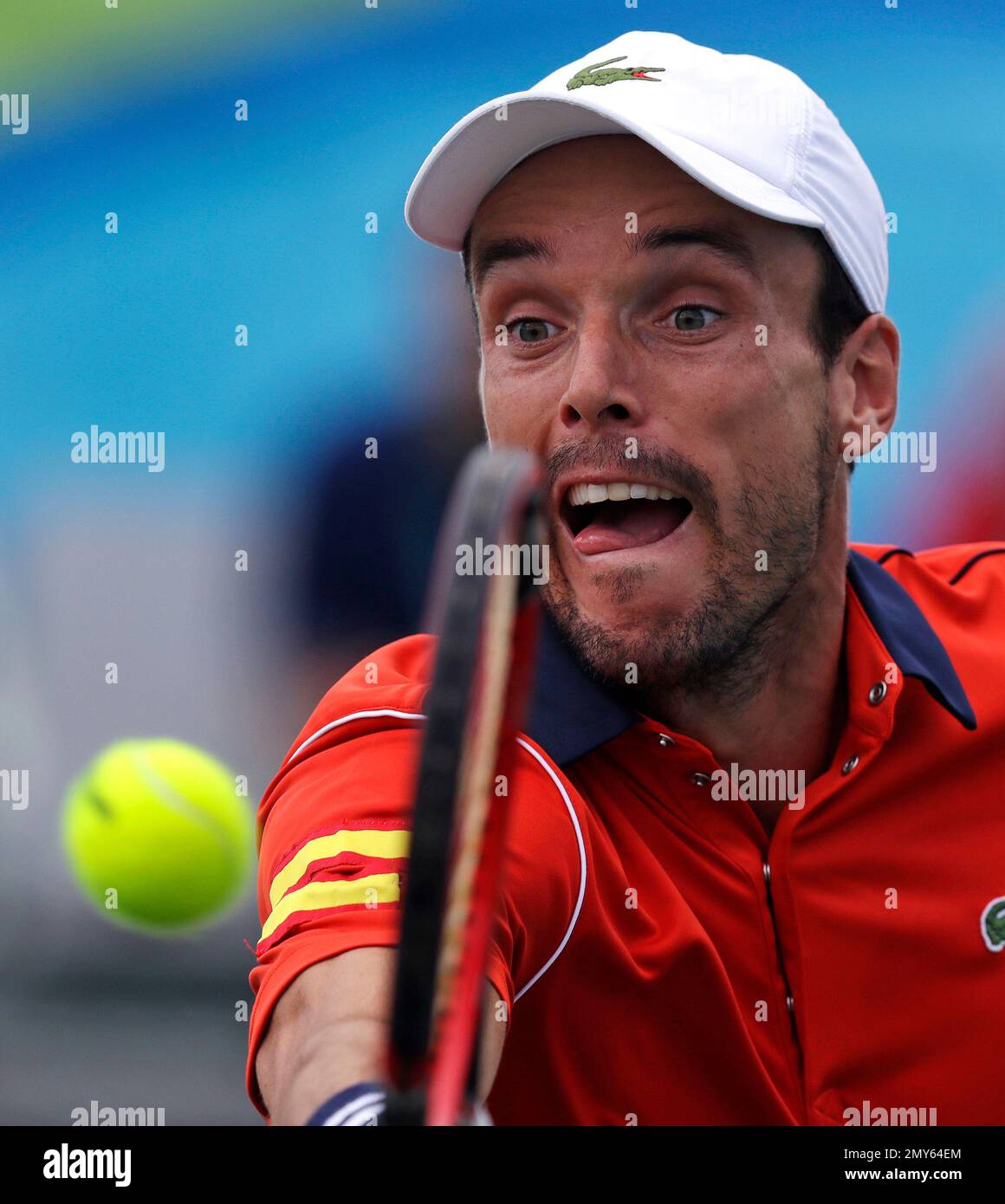 Roberto Bautista Agut, of Spain, returns to Gilles Muller, of ...