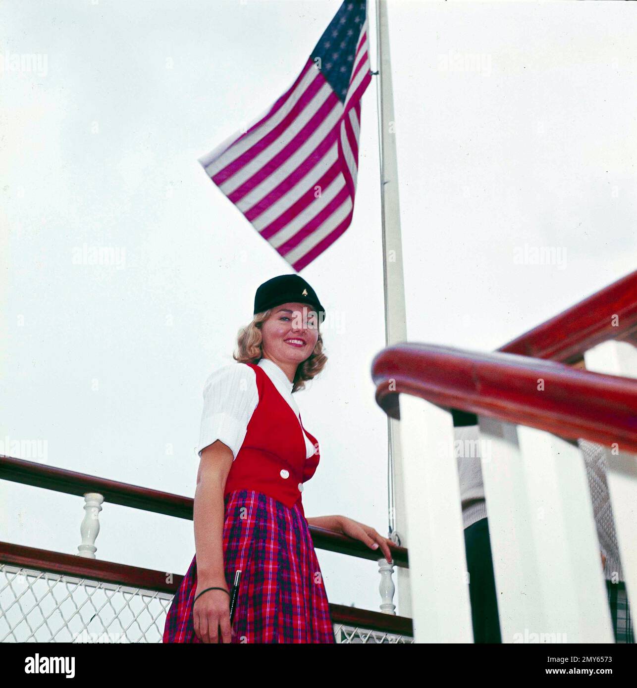 Disneyland guide, Diane Stewart, poses for a photo on the Mark Twain ...