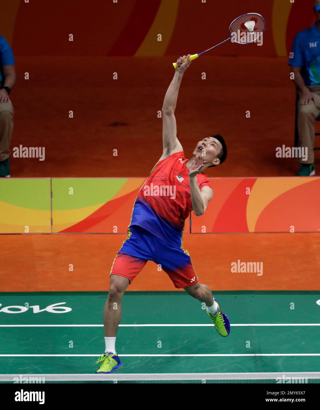 Malaysia's Chong Wei Lee returns a shot against Suriname's Soren Opti ...