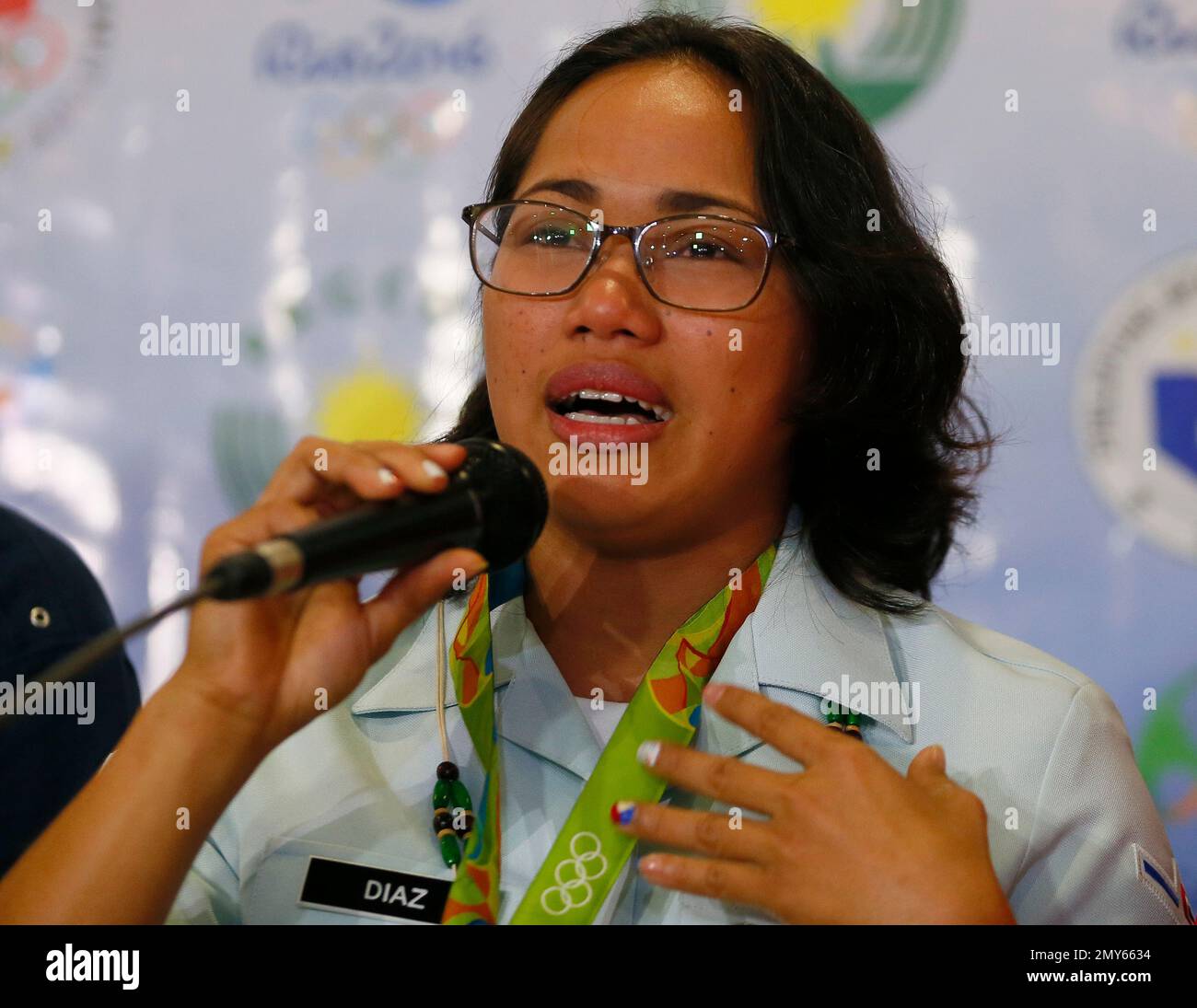 An emotional Hidilyn Diaz, who won Silver in the women's 53-kg ...