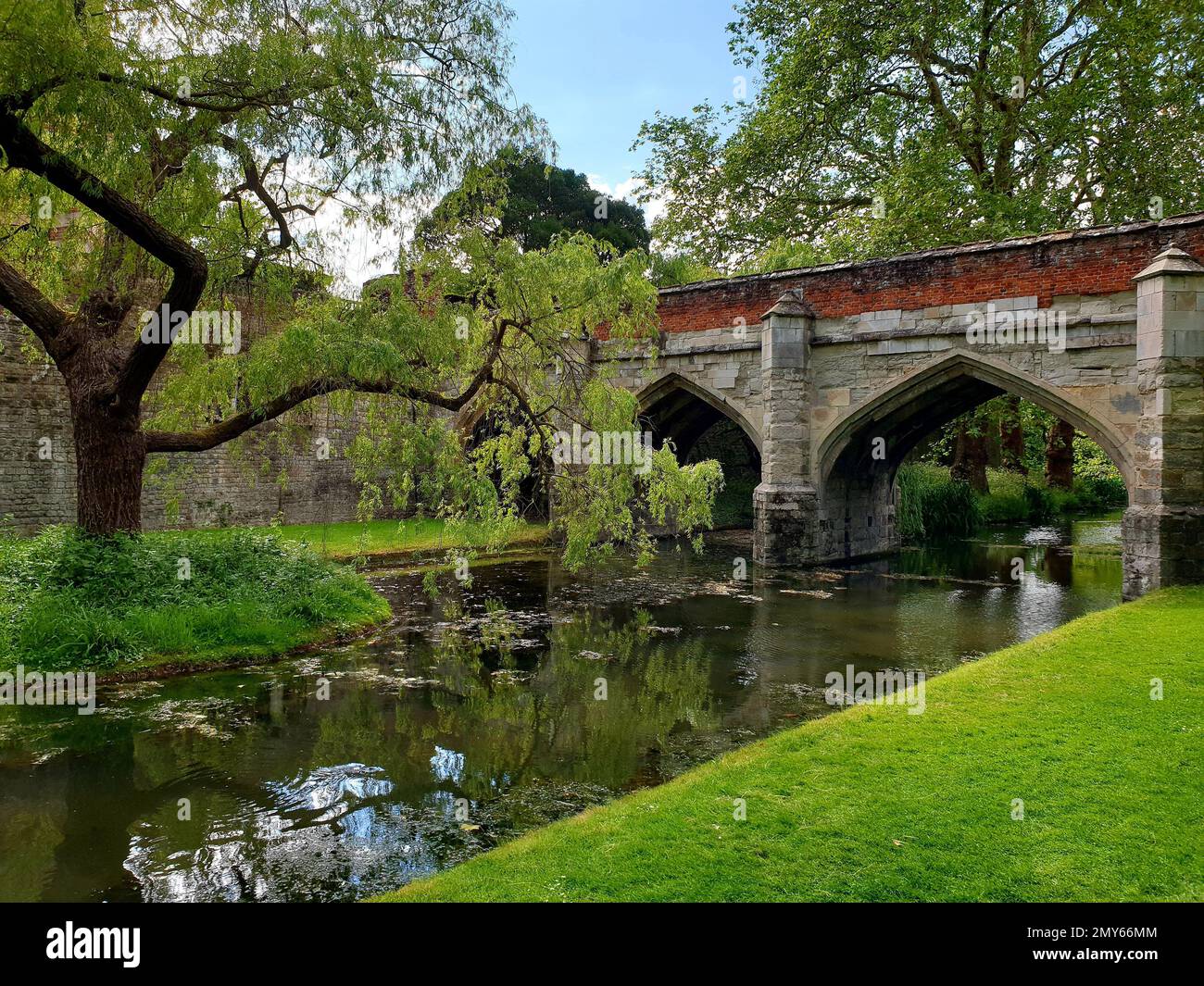A beautiful shot of Moat and bridge at Eltham Palace Gardens in London ...