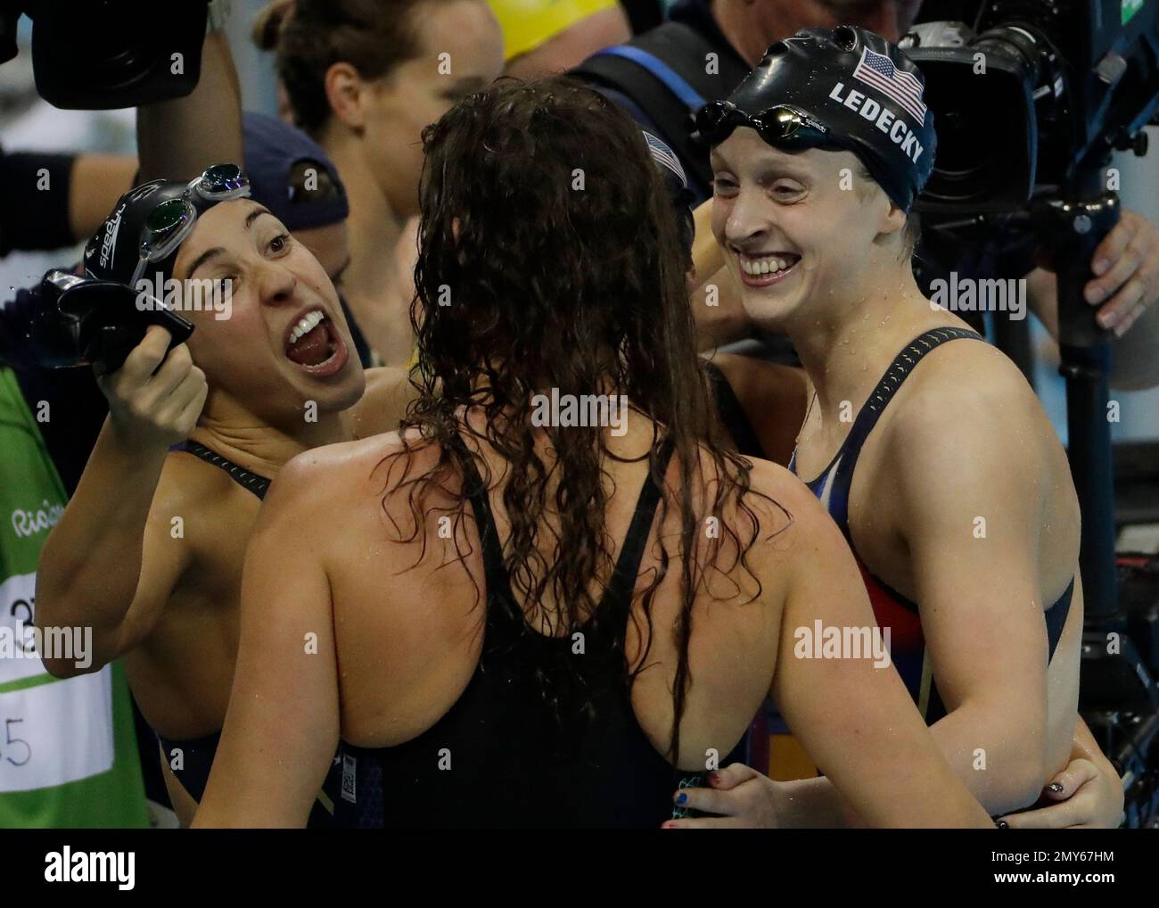 United States' Maya DiRado, left, Allison Schmitt, and Katie Ledecky ...