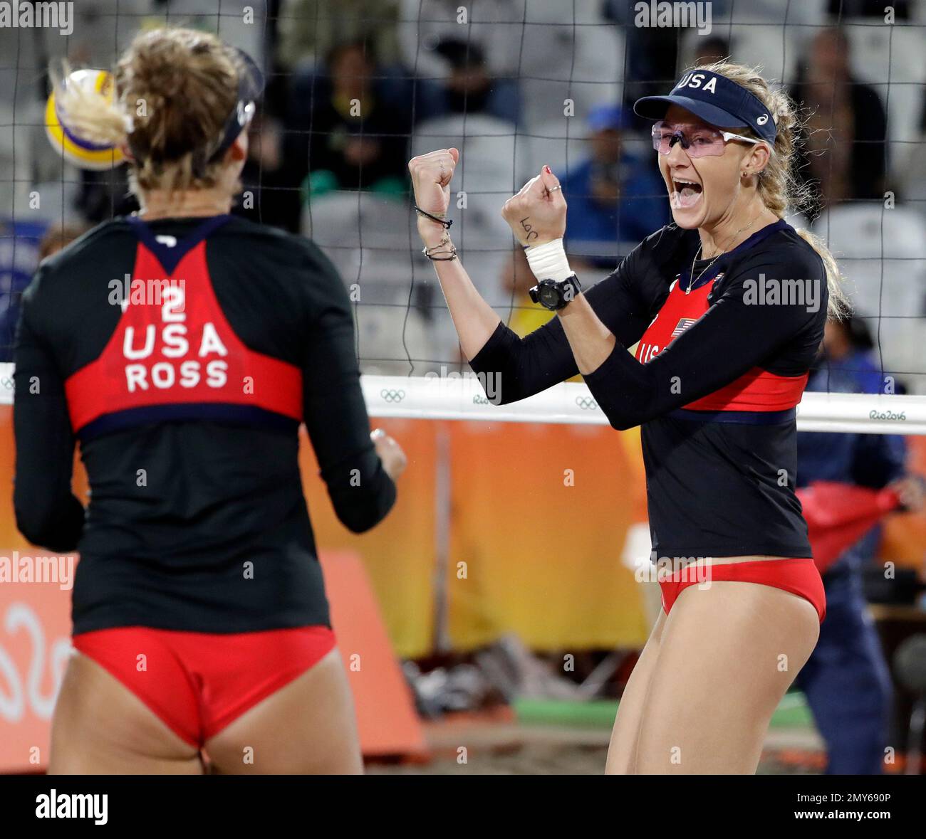 United States' Kerri Walsh Jennings, right, celebrates a point with ...