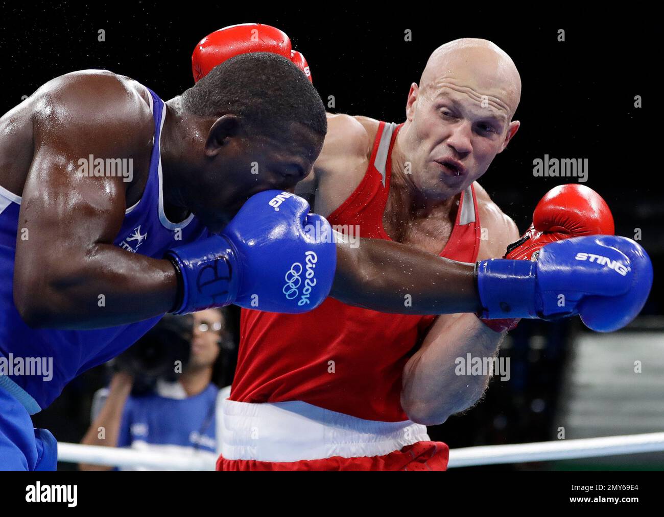 Kazakhstan's Vassiliy Levit, right, fights Mauritius' Kennedy St Pierre ...