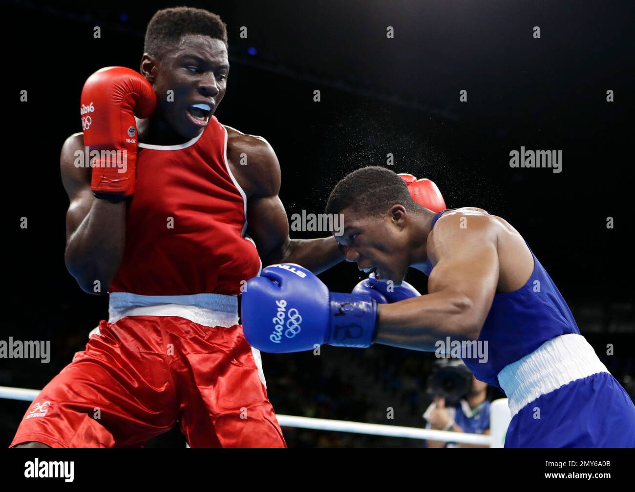 Haiti's Haiti's Richardson Hitchins, left, fights United State's Gary ...