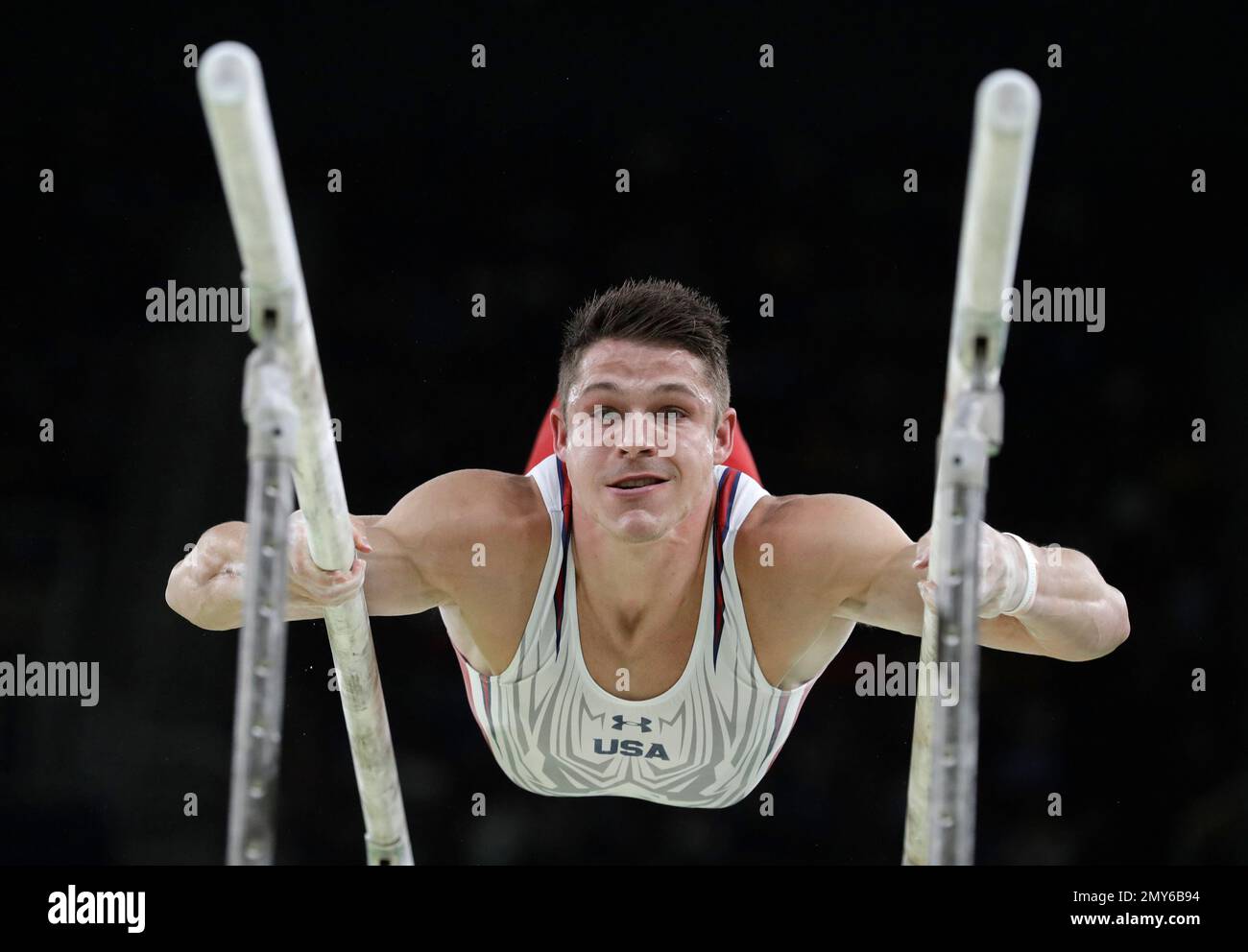 United States' Chris Brooks performs on the parallel bars during the ...