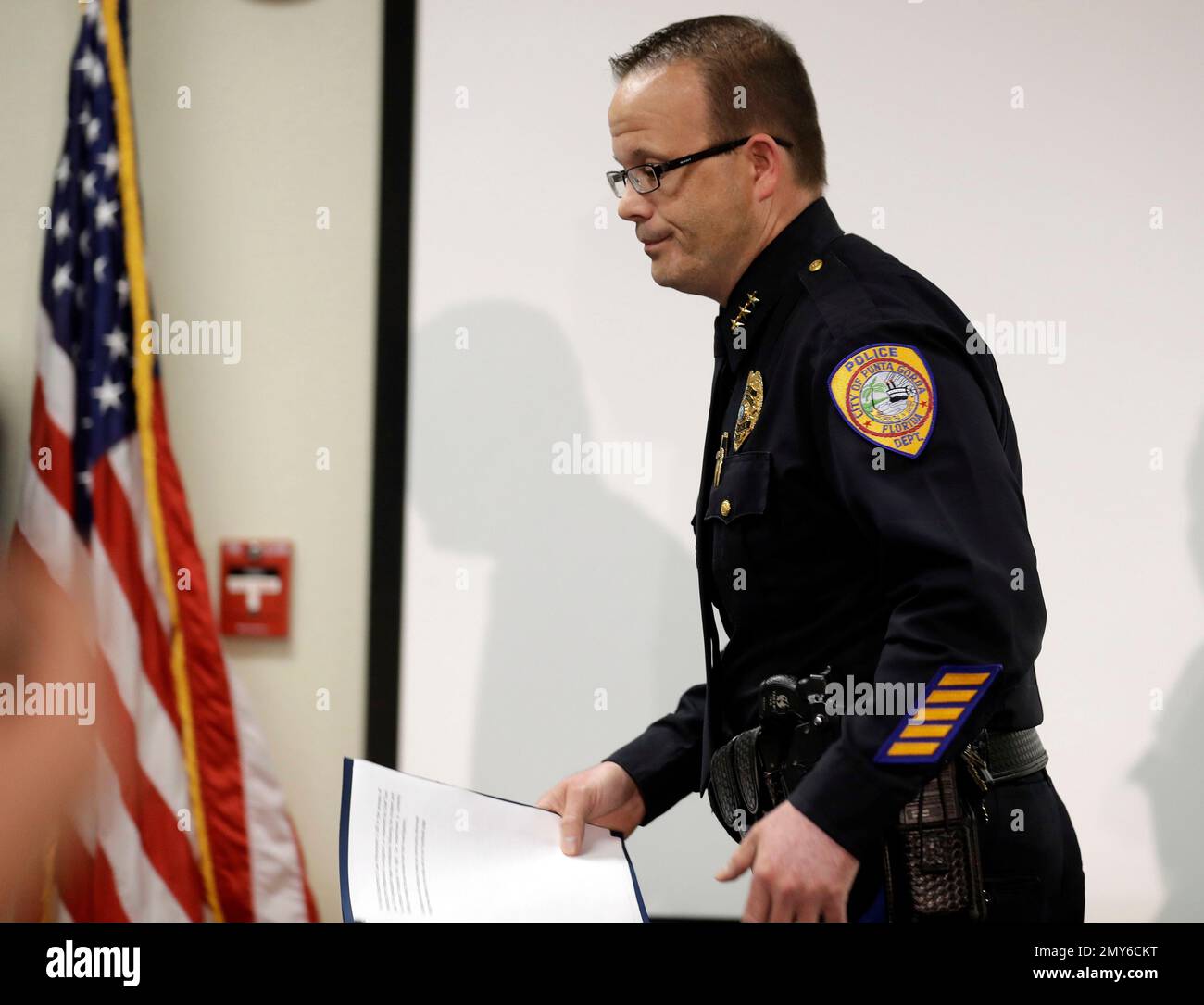Punta Gorda, Fla., Police Chief Tom Lewis walks away after addressing ...