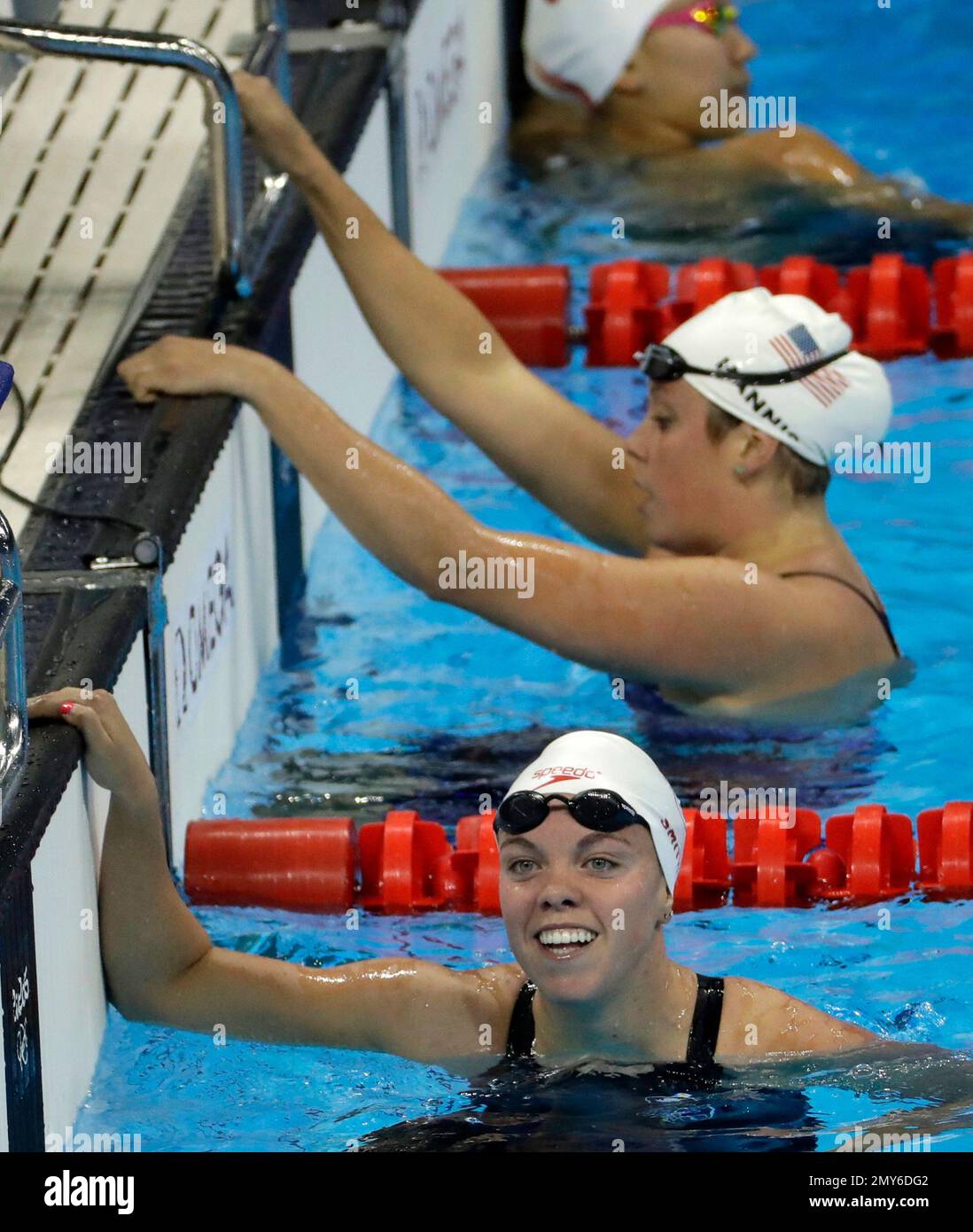 Canada's Kierra Smith smiles after winning a heat of the women's 200 ...