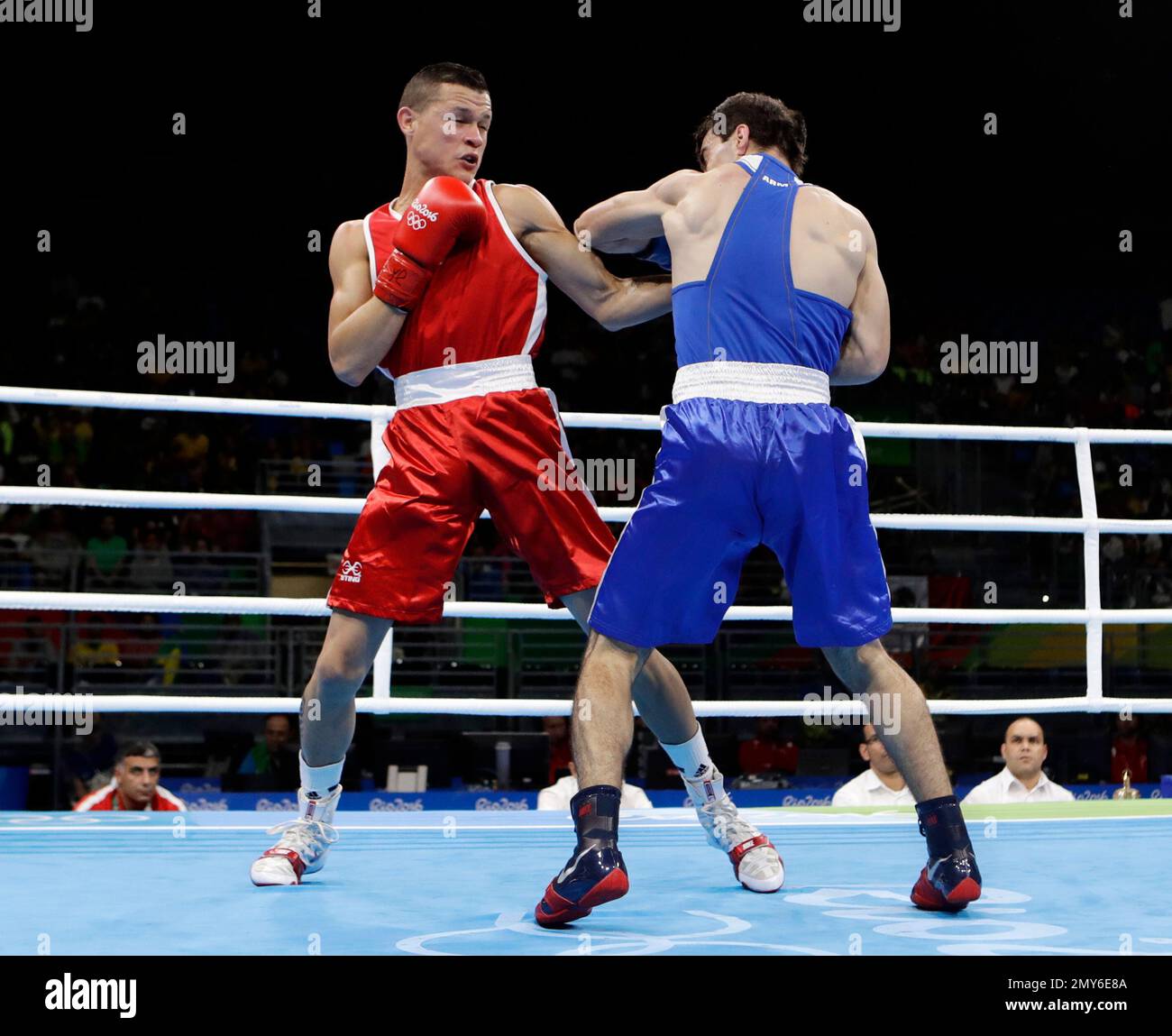 Venezuela's Luis Martin Arcon, left, fights Armenia's Hovhannes Bachkov ...