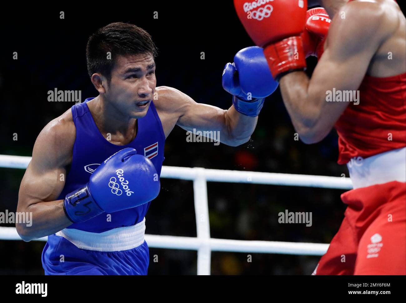 Thailand's Chatchai Butdee, left, fights Britain's Qais Ashfaq during a ...