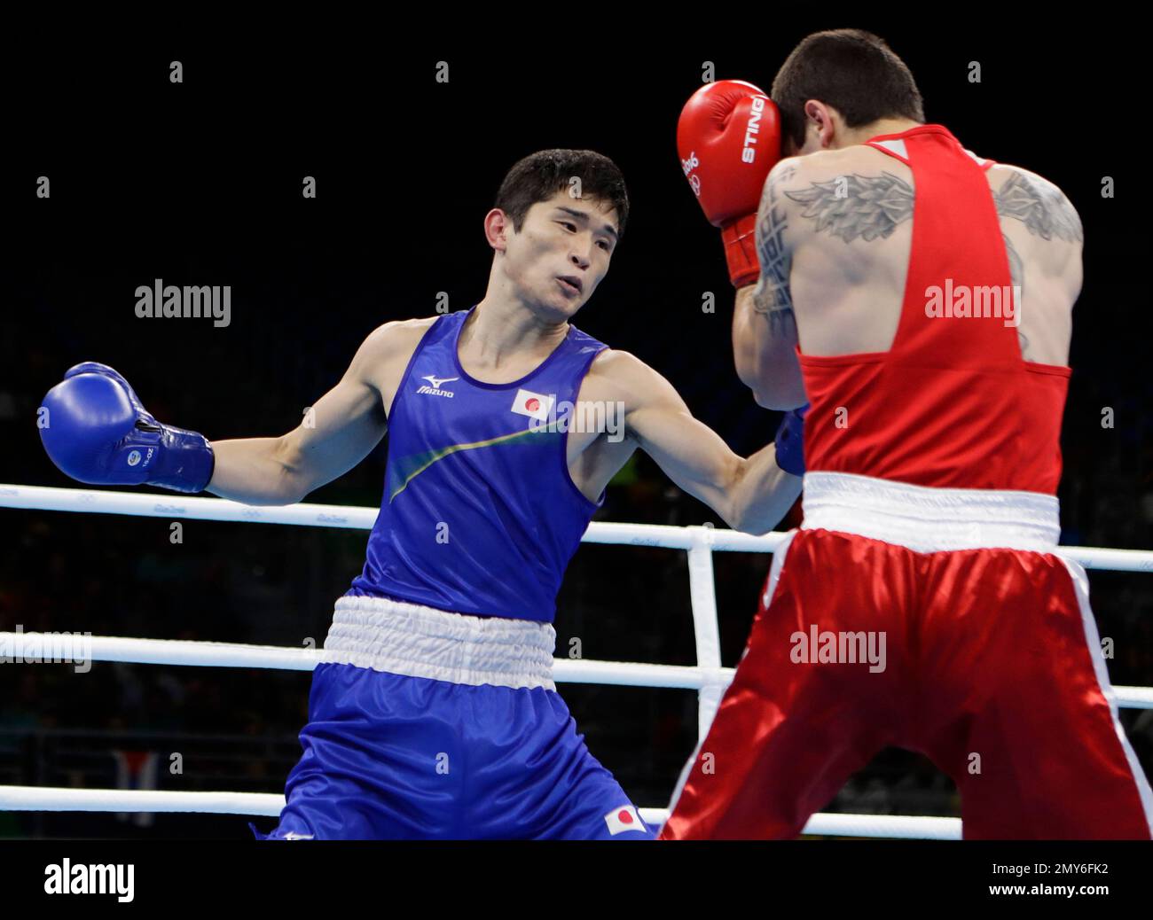 Japan's Arashi Morisaka, left, fights Armenia's Aram Avagyan during a ...