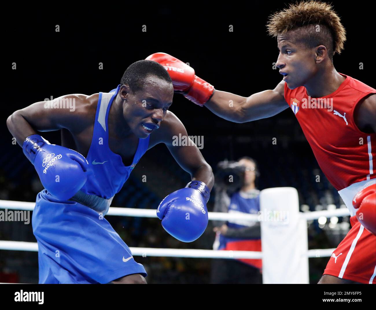 Cuba's Joahnys Argilagos, right, fights Kenya's Peter Mungai Warui ...