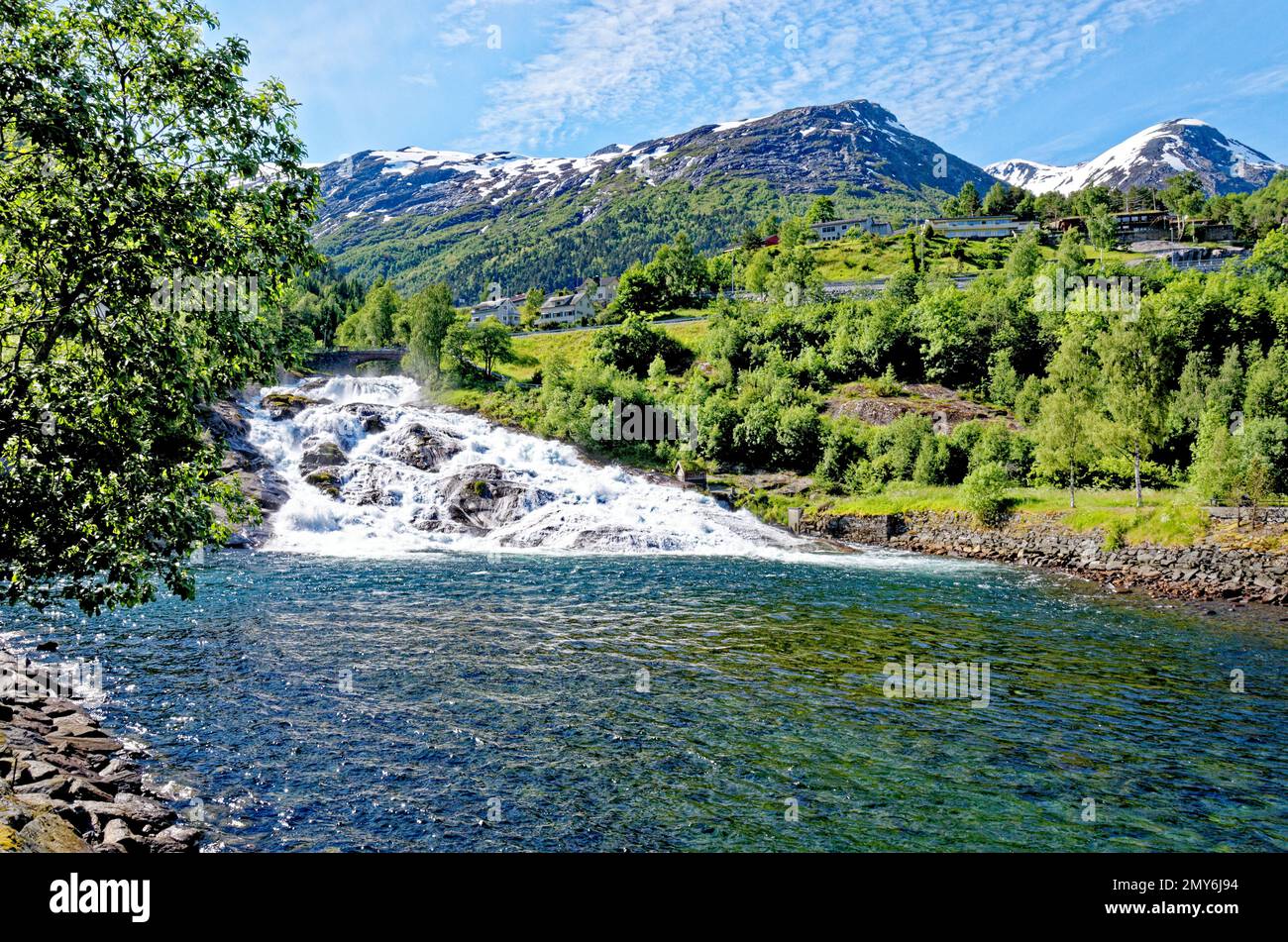 Hellesyltfossen - waterfall rushing at Hellesylt on the Geiranger fjord ...