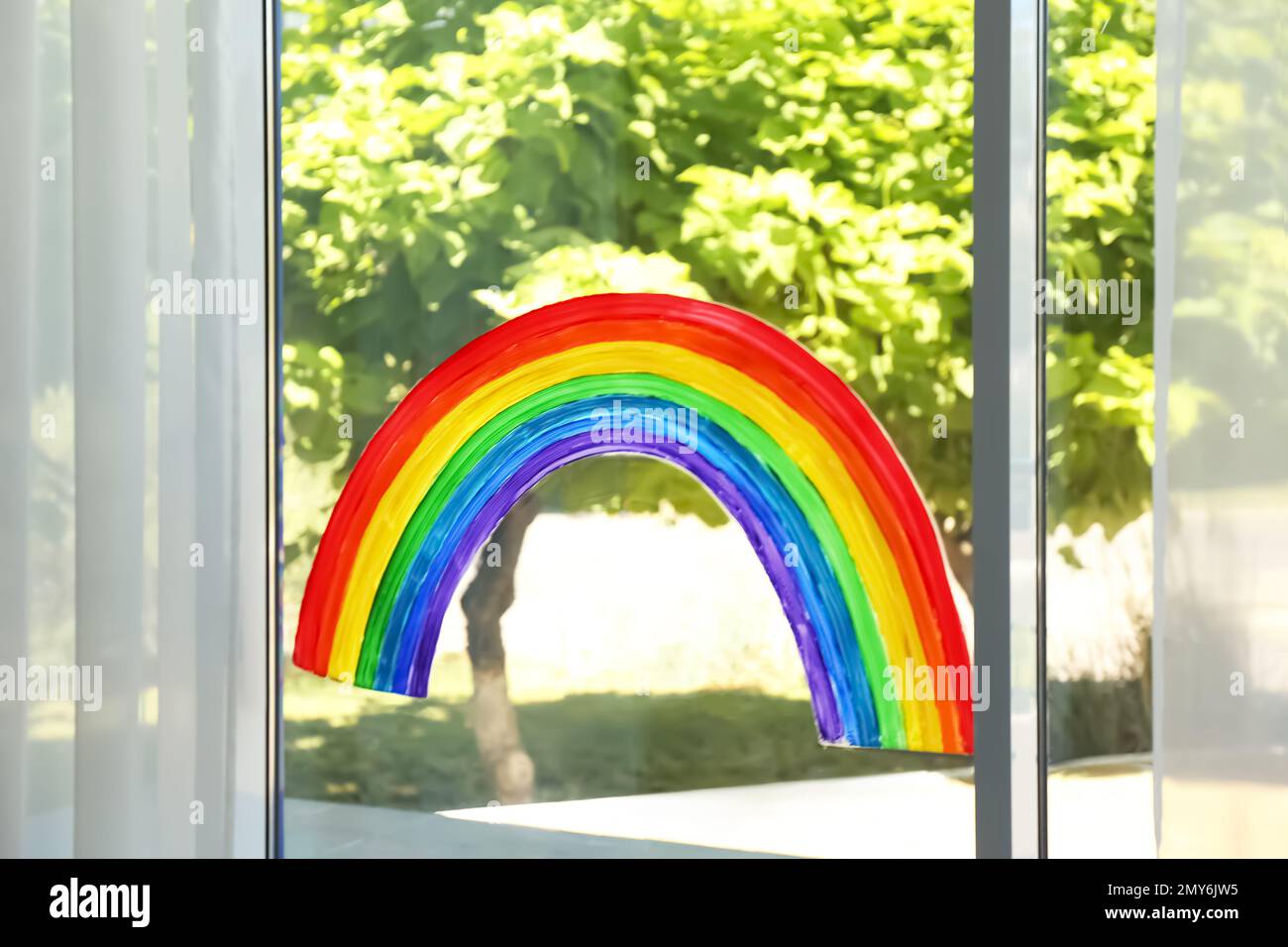 Painting of rainbow on window indoors. Stay at home concept Stock Photo ...