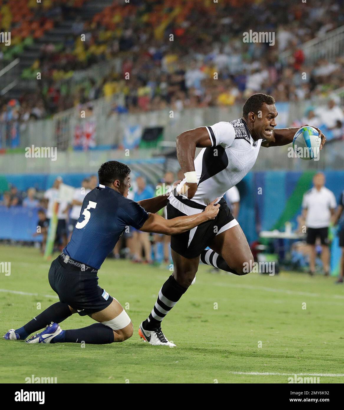 Fiji's Leone Nakarawa, right, is tackled by Argentina's Axel M'ller, during the men's rugby ...