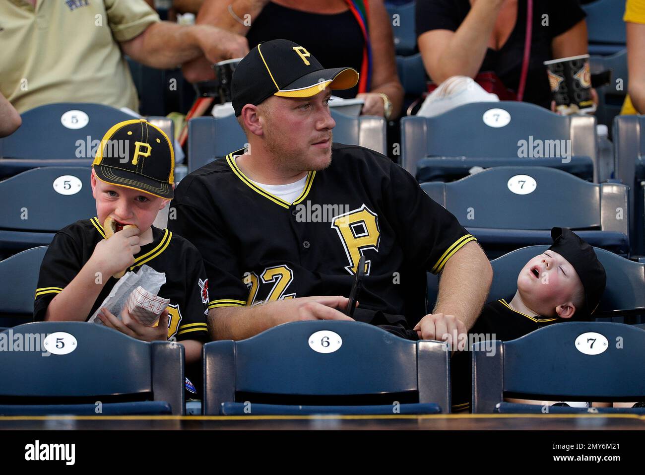 Sean Hertzog, center, of Houston, and his two sons Brayden, 5, and ...