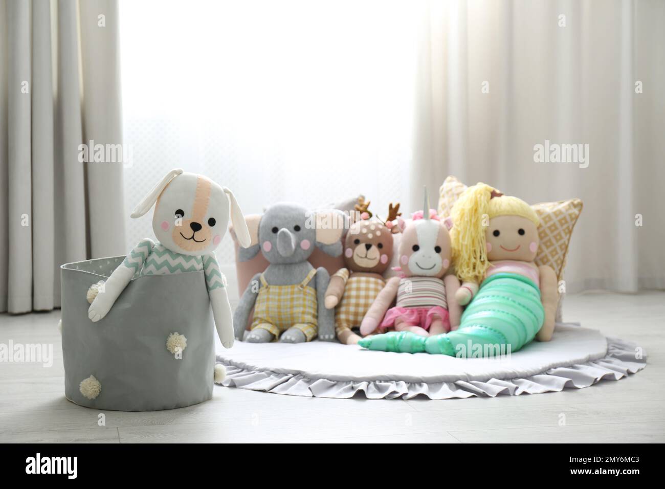 Funny stuffed toys on floor. Decor for children's room interior Stock ...