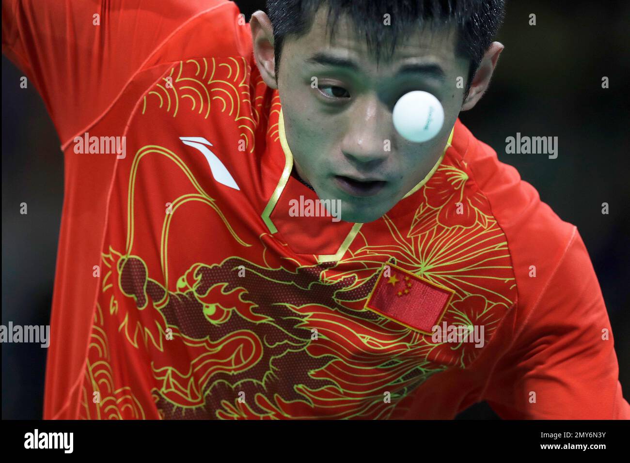Zhang Jike of China eyes the ball as he is playing against Koki Niwa of ...