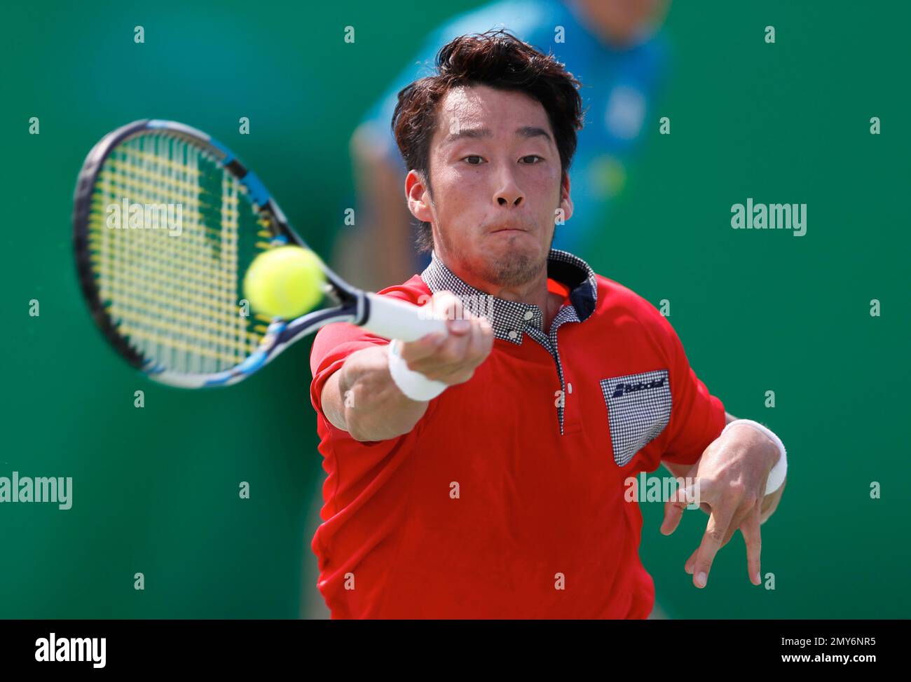 Japan's Yuchi Sugita returns to France's Gilles Simon in the men's ...