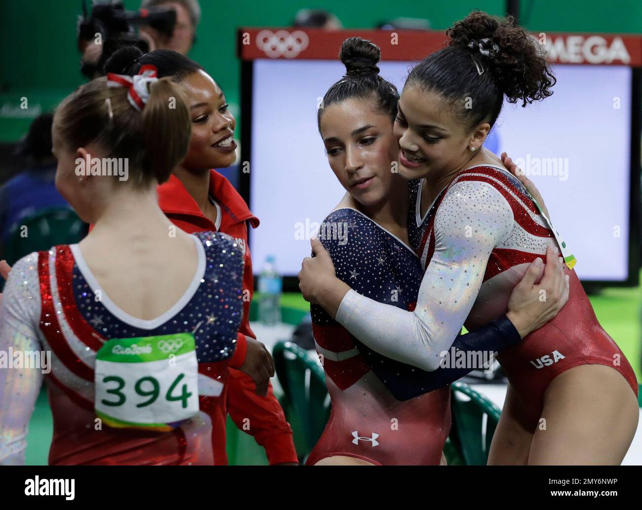 United States' Lauren Hernandez hugs teammate Aly Raisman during the ...