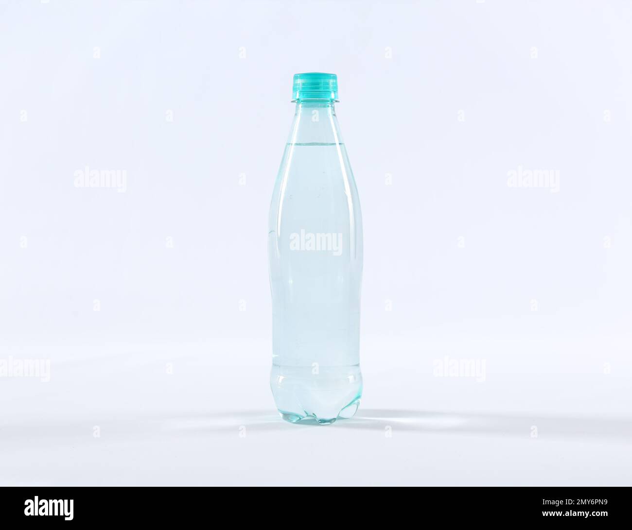 Plastic bottle of pure water isolated on white Stock Photo - Alamy