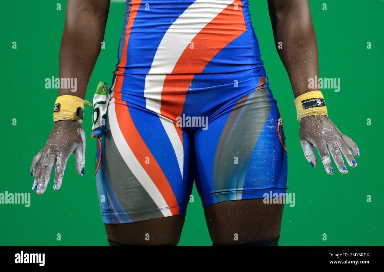 Marina de la Caridad Rodriguez Mitjan, of Cuba waits with chalk on her ...