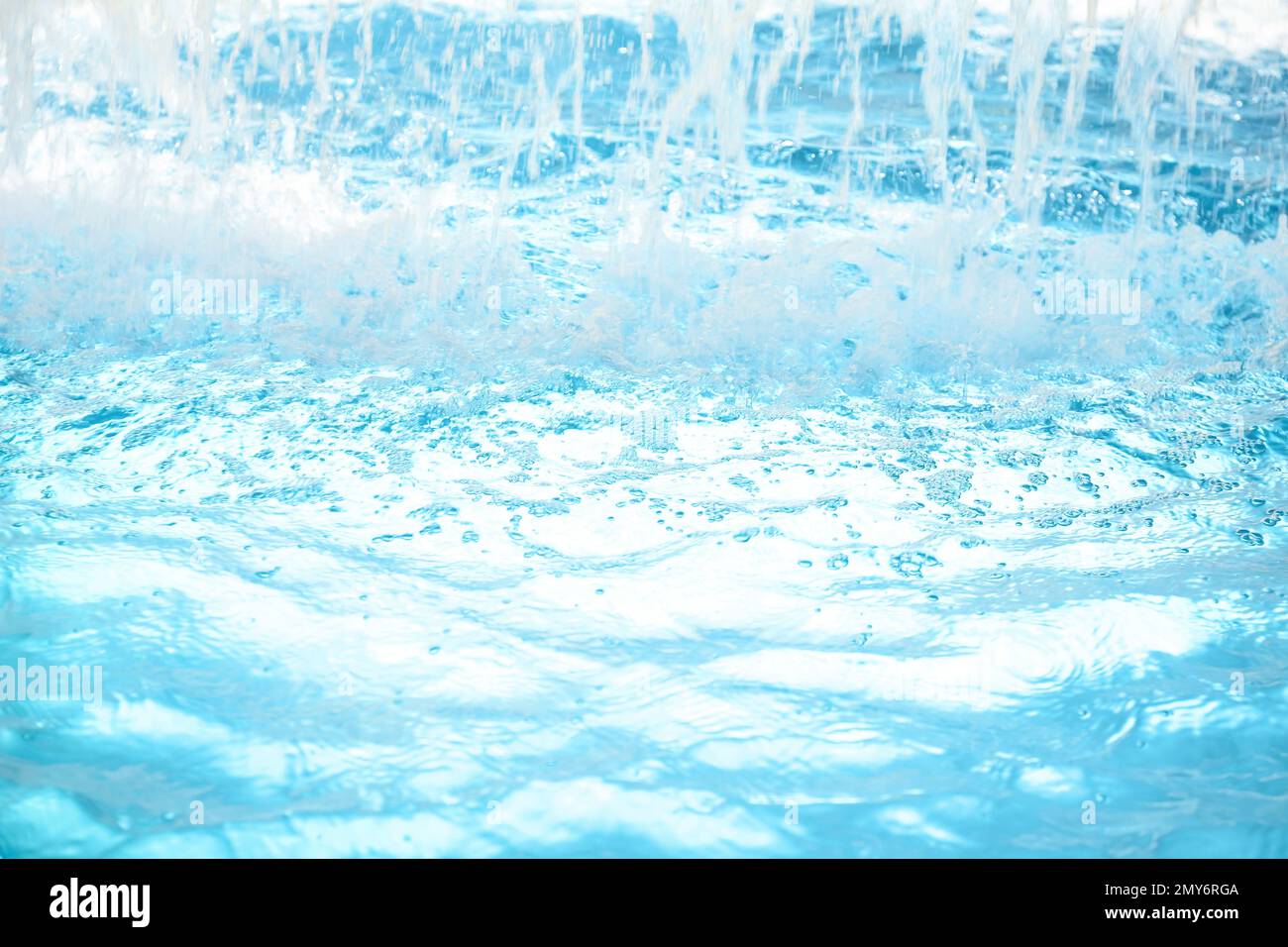 View of water splashing in swimming pool Stock Photo - Alamy