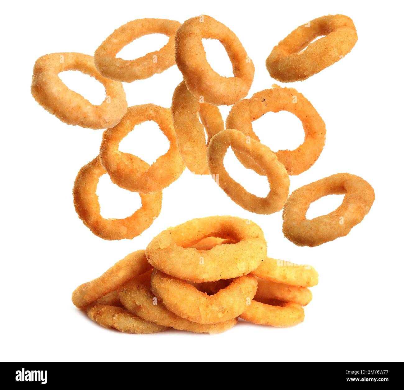 Fried onion rings falling on white background Stock Photo - Alamy
