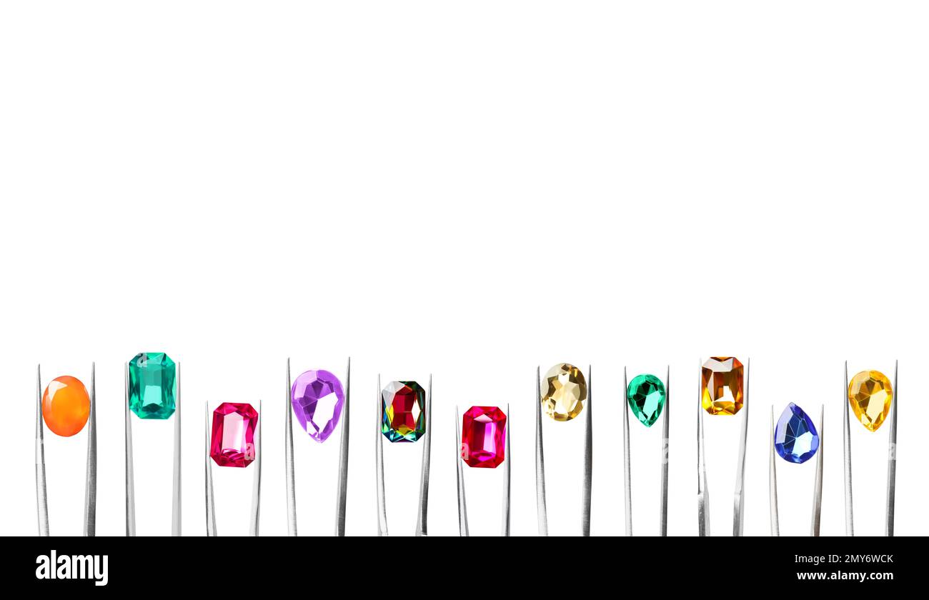 Set of tweezers with different shiny gemstones on white background ...