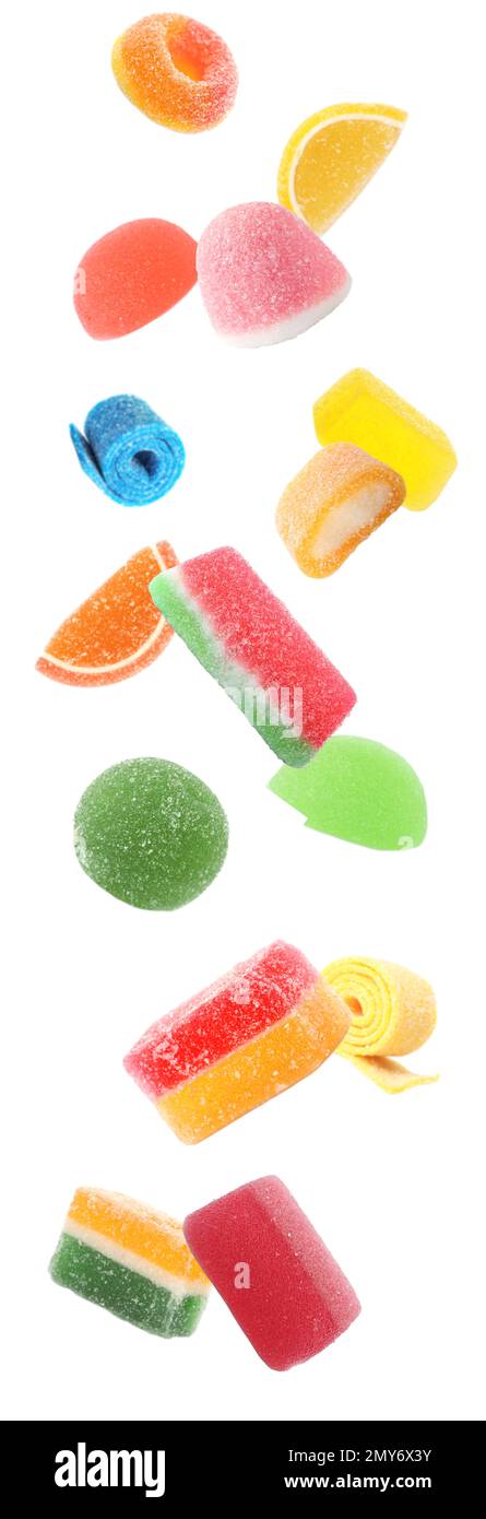 Different delicious candies falling on white background Stock Photo - Alamy