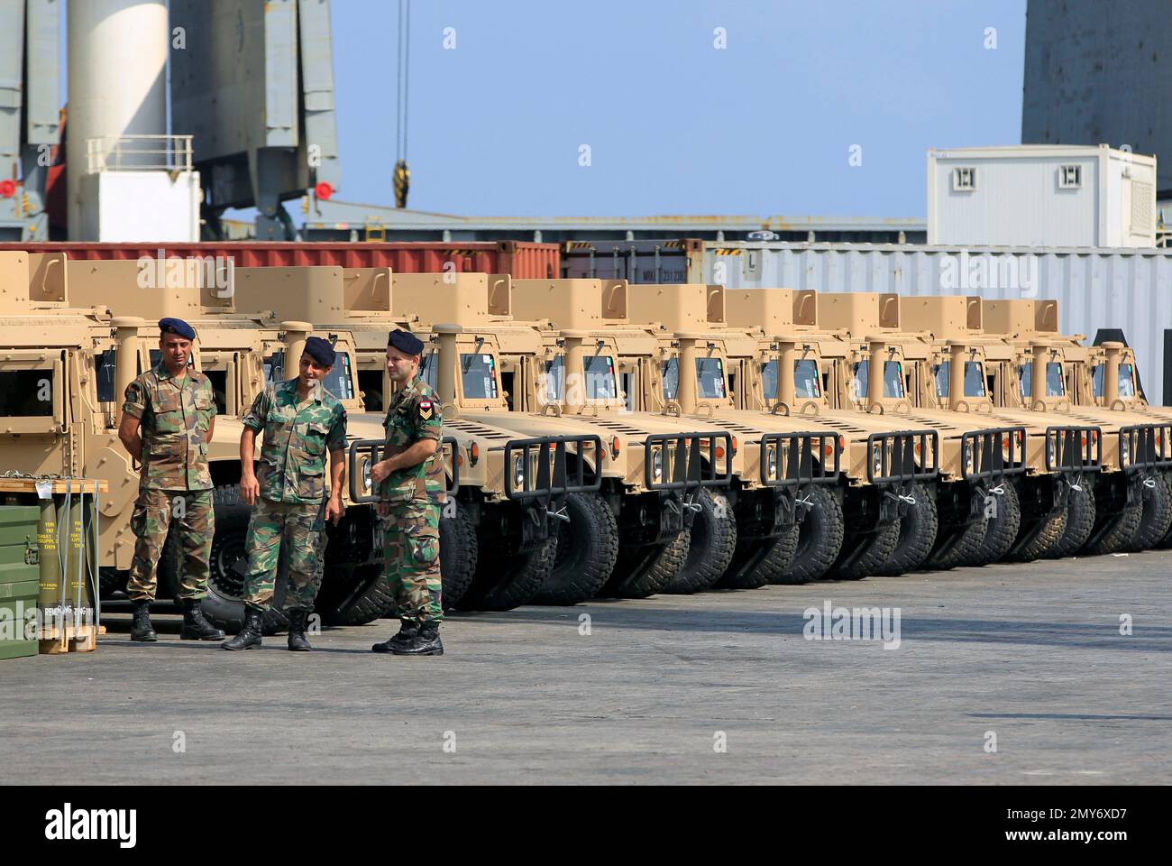 Lebanese army soldiers stand near military vehicles that were unloaded ...