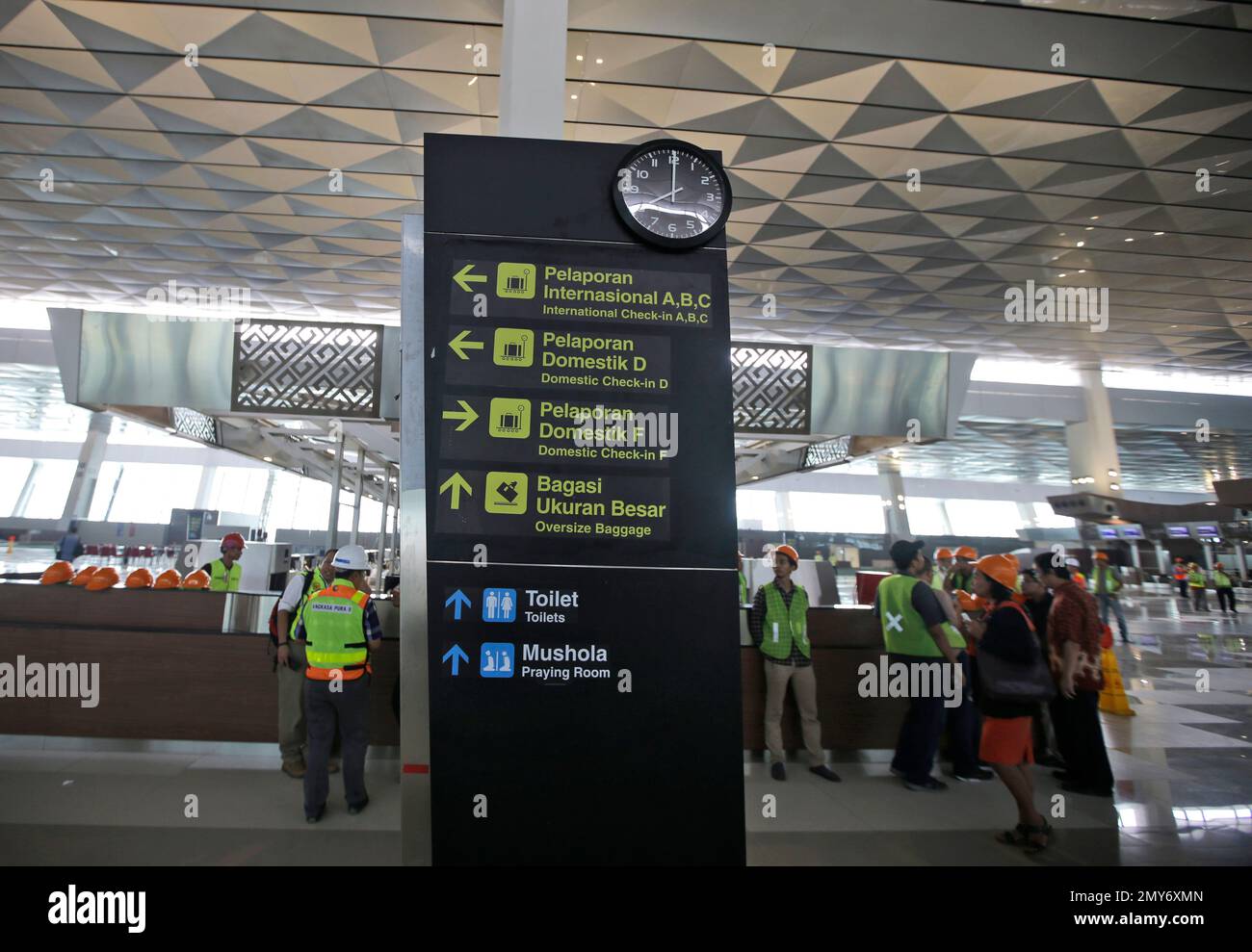 In this Sunday, June 12, 2016 photo, workers prepare for the ...