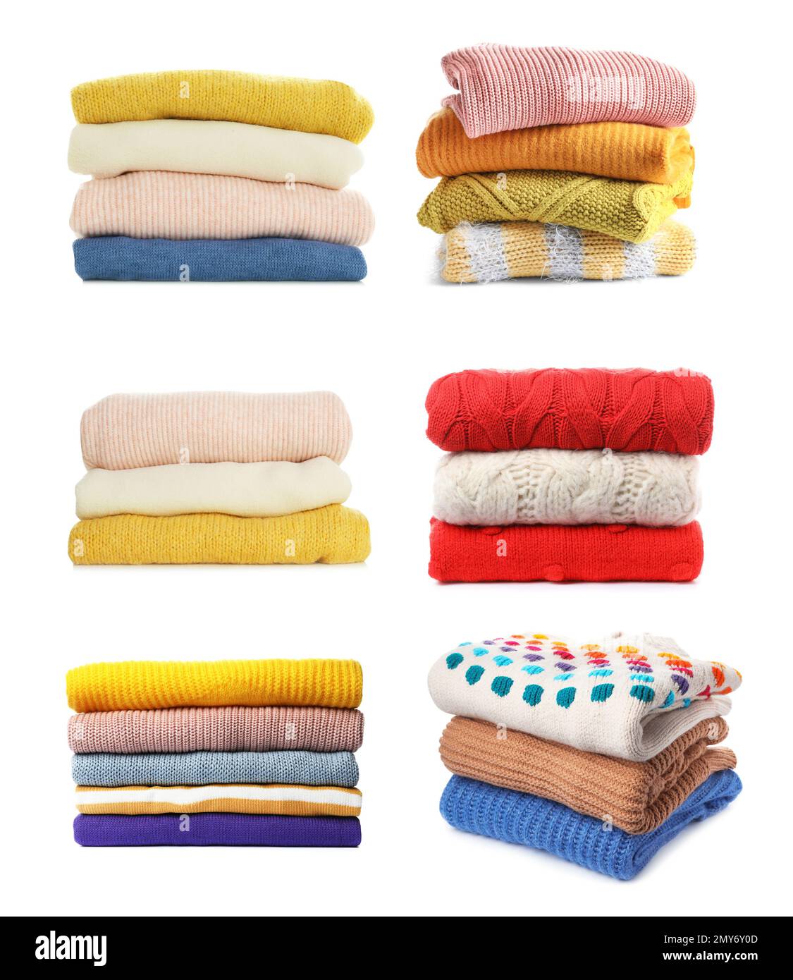 Set of folded and stacked sweaters on white background Stock Photo - Alamy