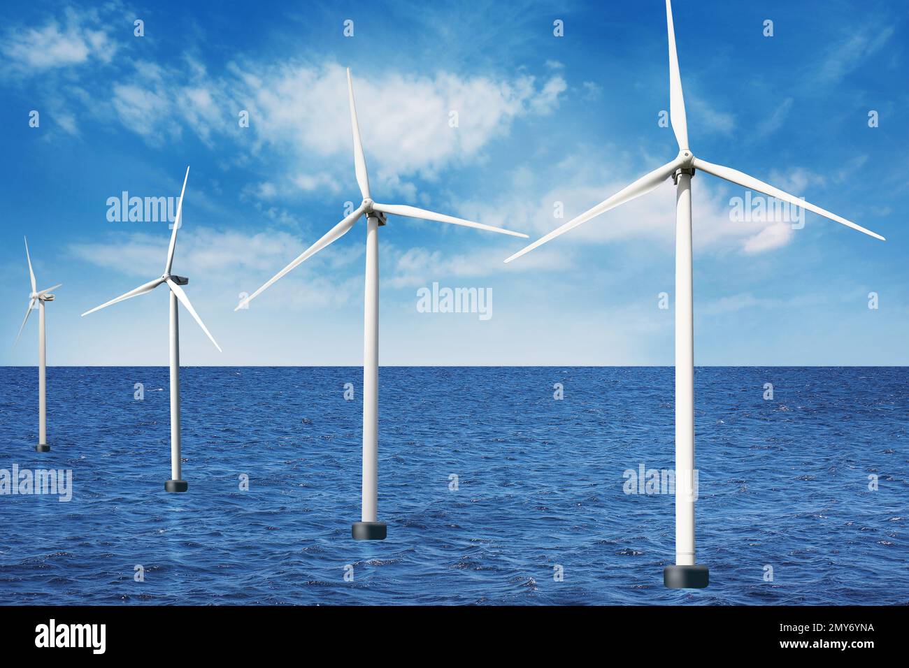 Floating wind turbines installed in sea under blue sky. Alternative ...
